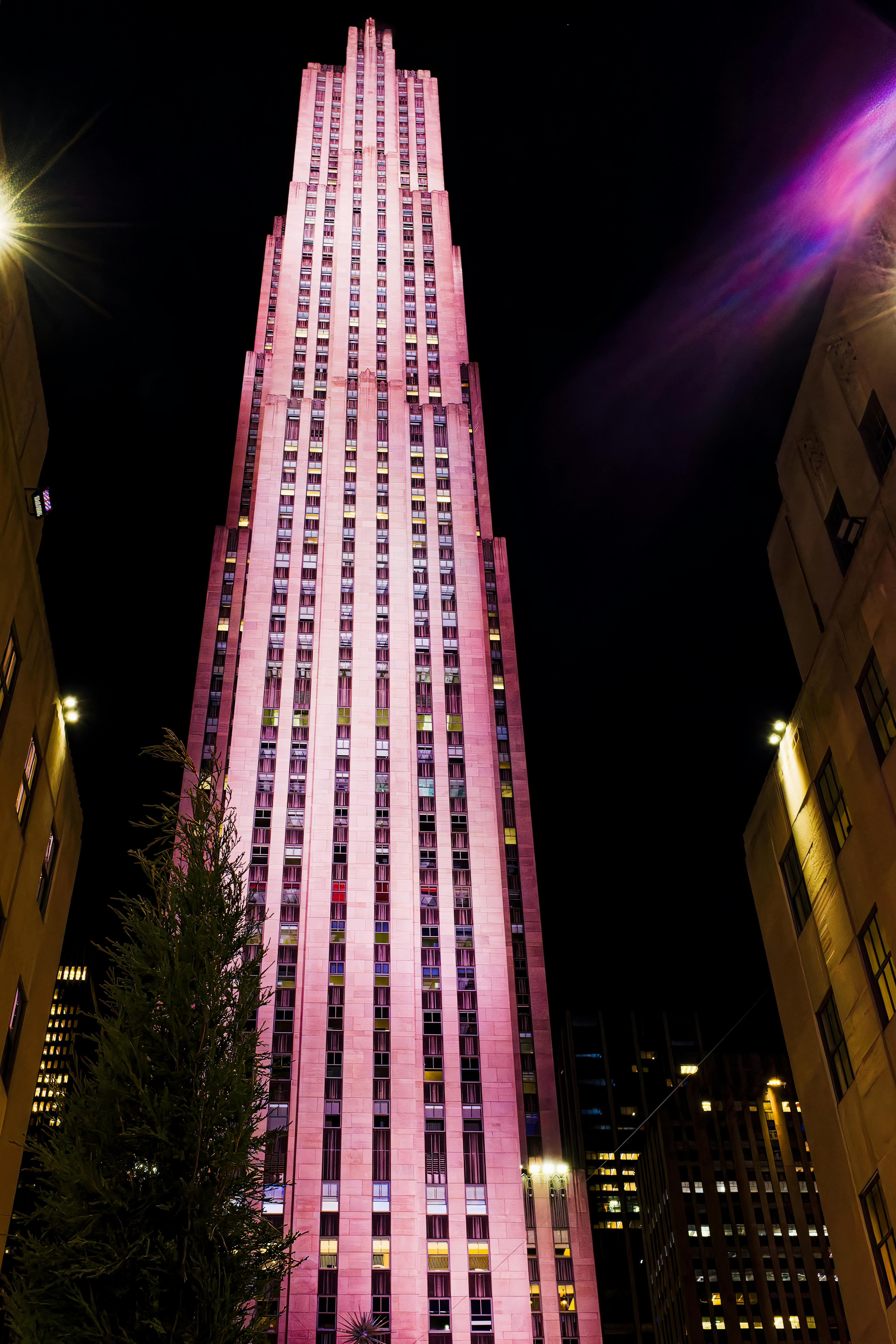 Purple And Pink Lighted Building During Night Time · Free Stock Photo