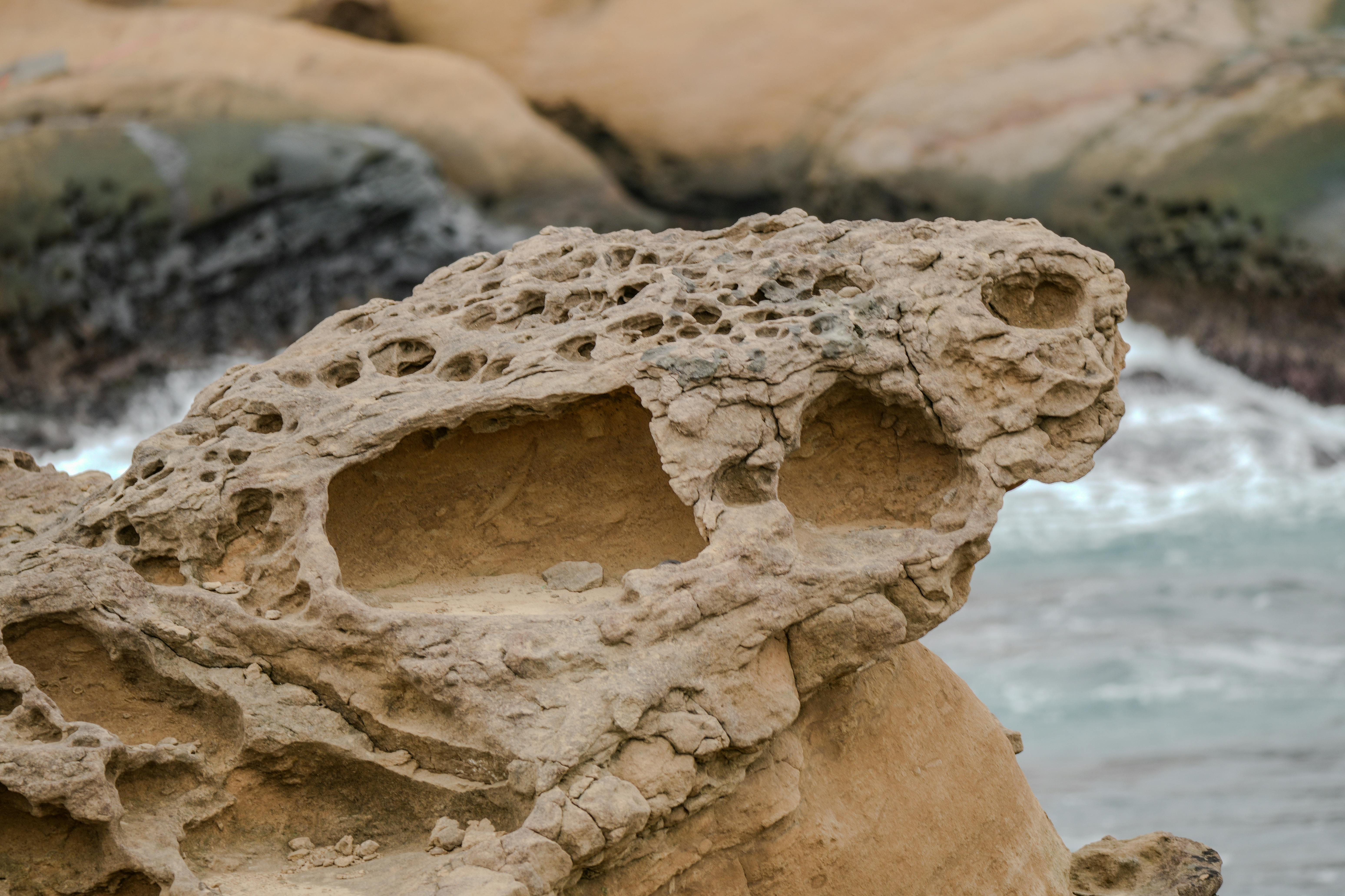Close-up of Rock Formation on the Coast of Sea · Free Stock Photo