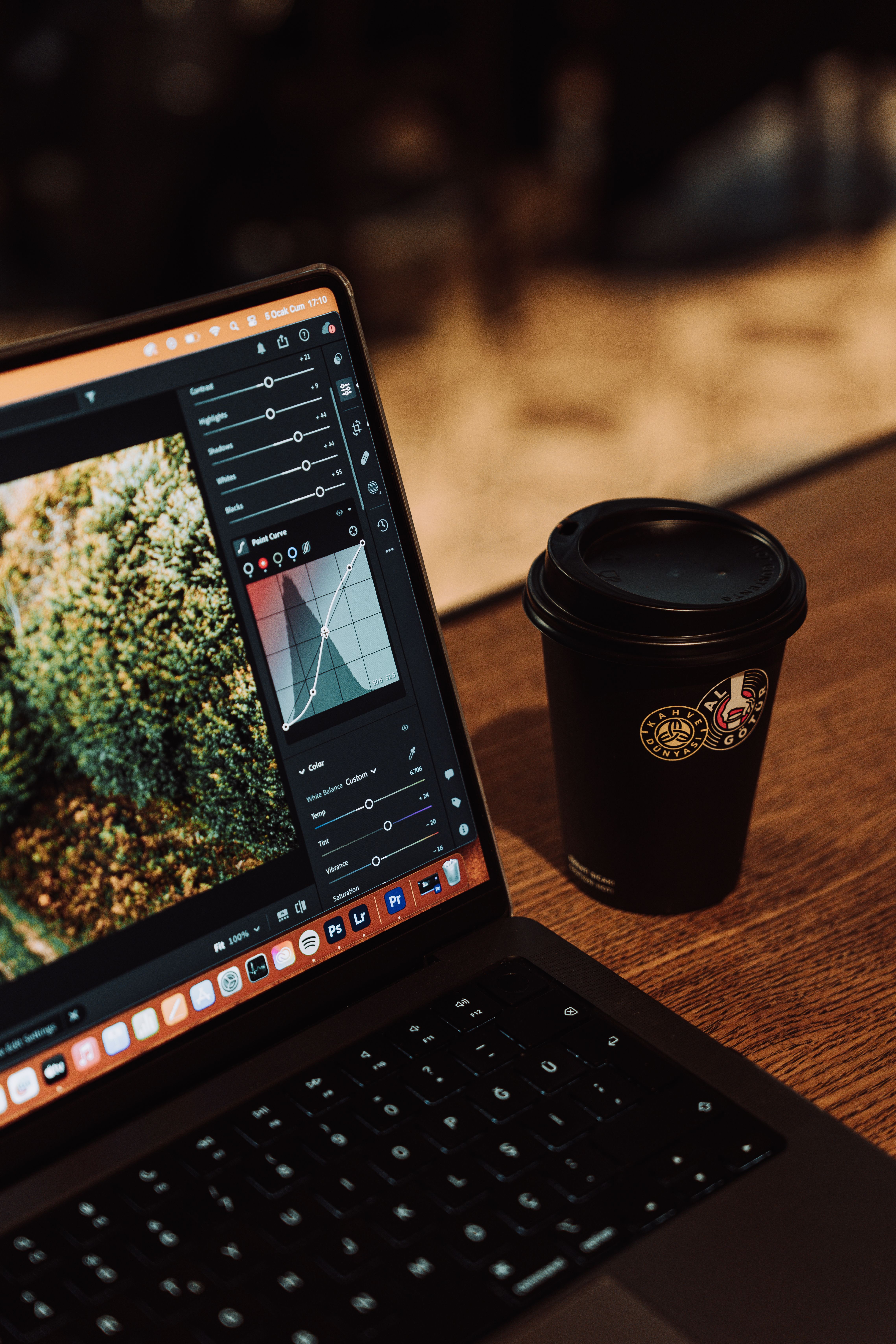 Coffee Cup by Laptop with Grahic Design Software · Free Stock Photo