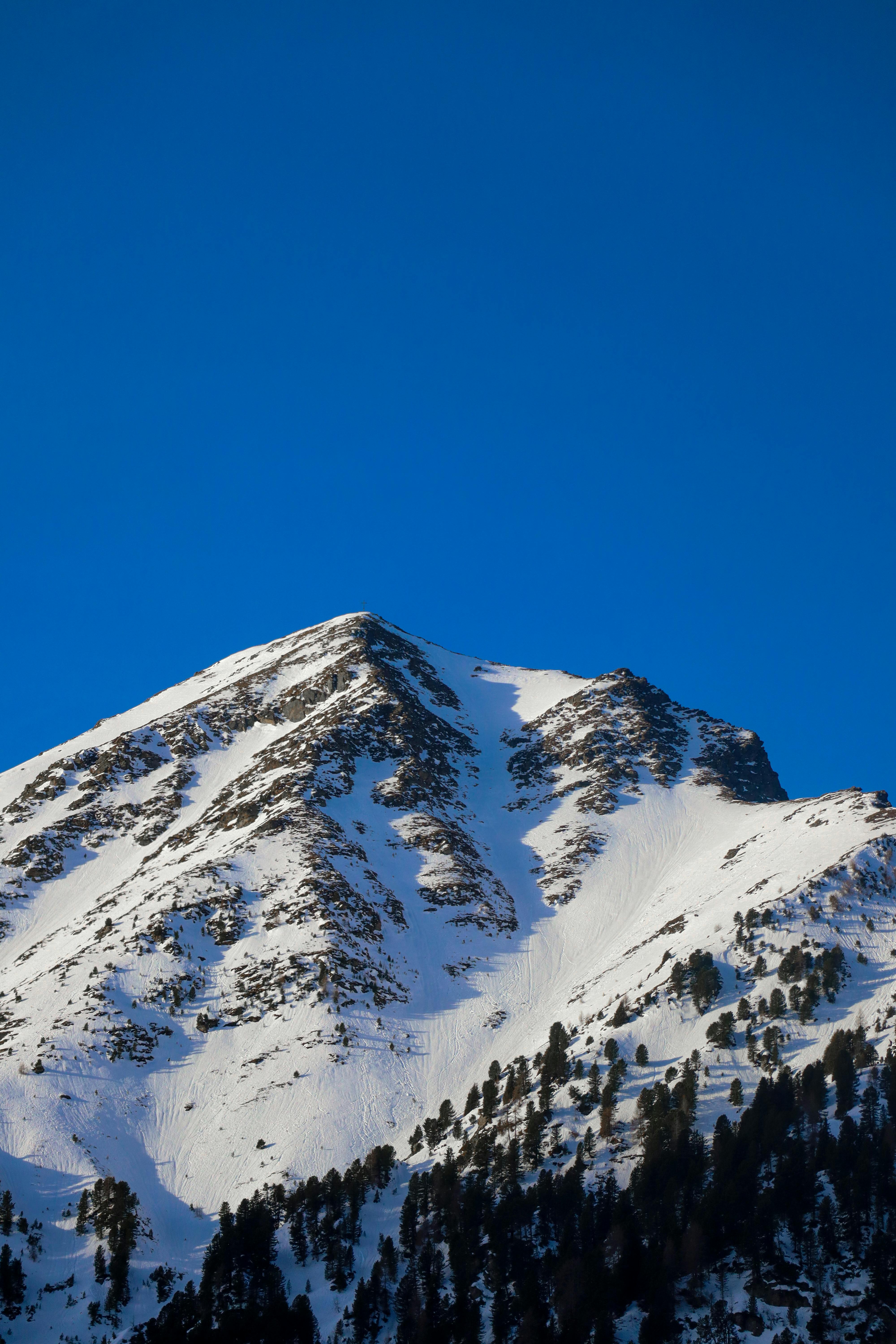 Winter Landscape with Snow Covered Mountain Peak against Blue Sky ...