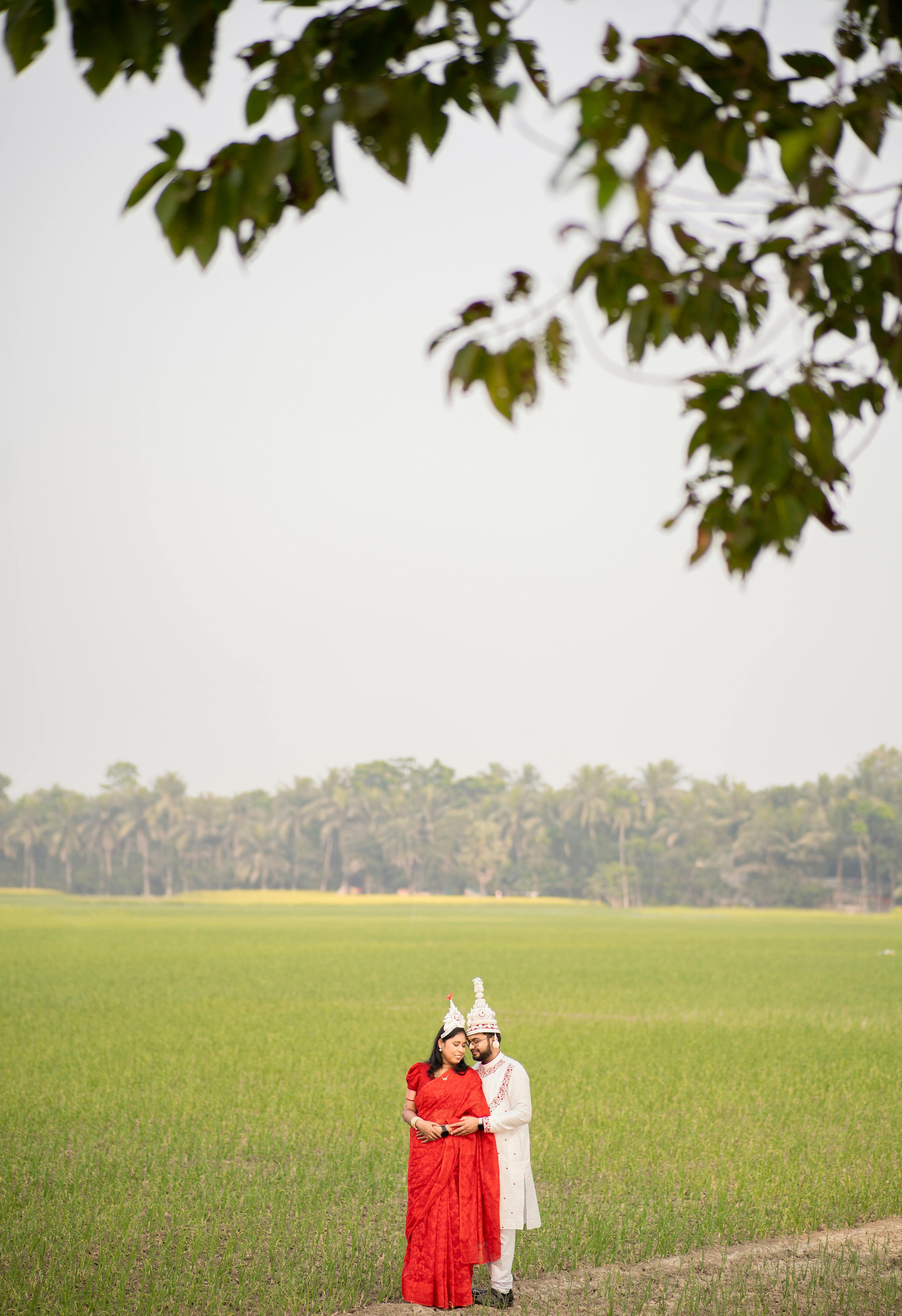 Couple Wearing Traditional Costumes in Rural Scenery · Free Stock Photo