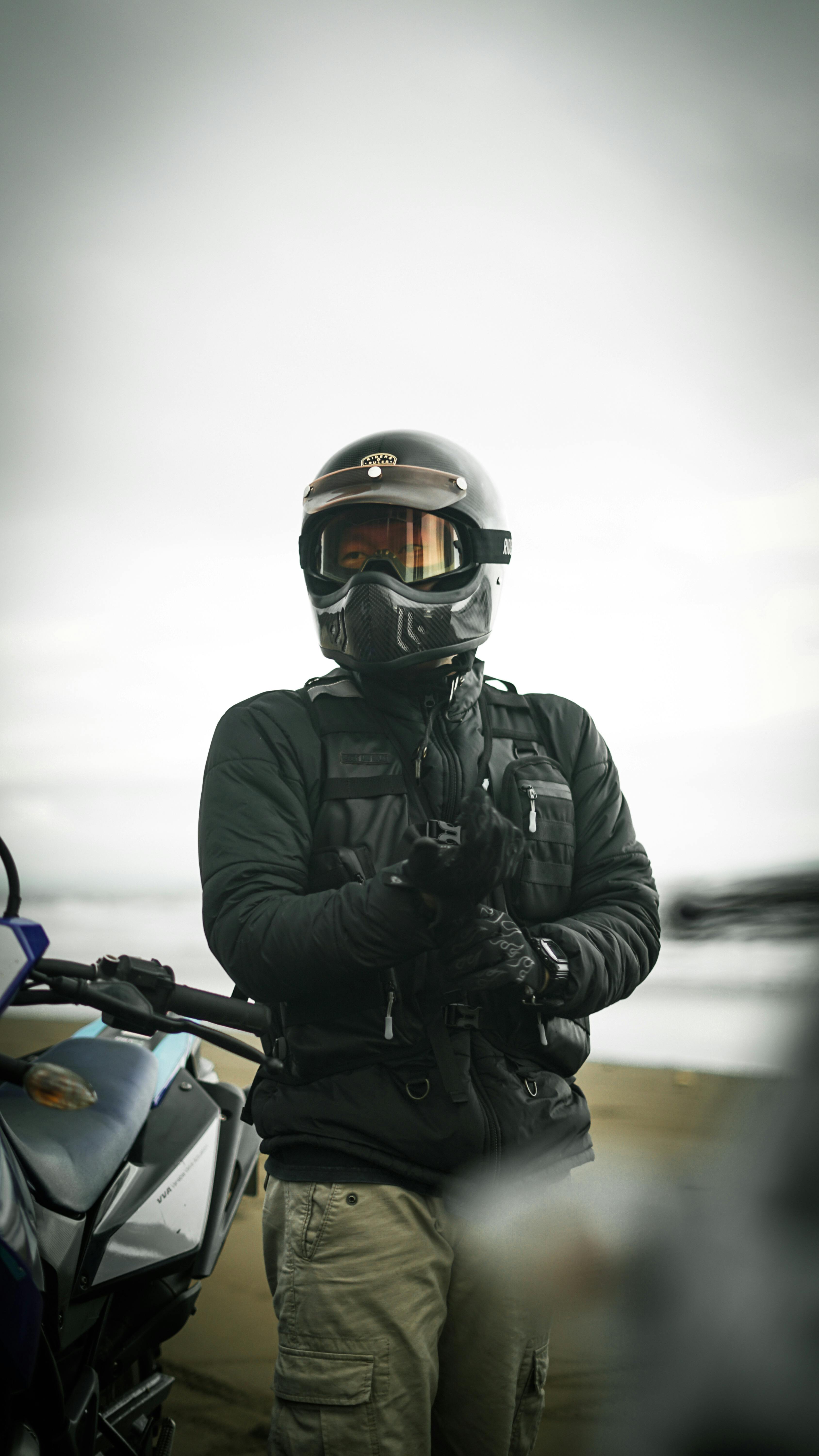Person in a Motorcycle Uniform · Free Stock Photo