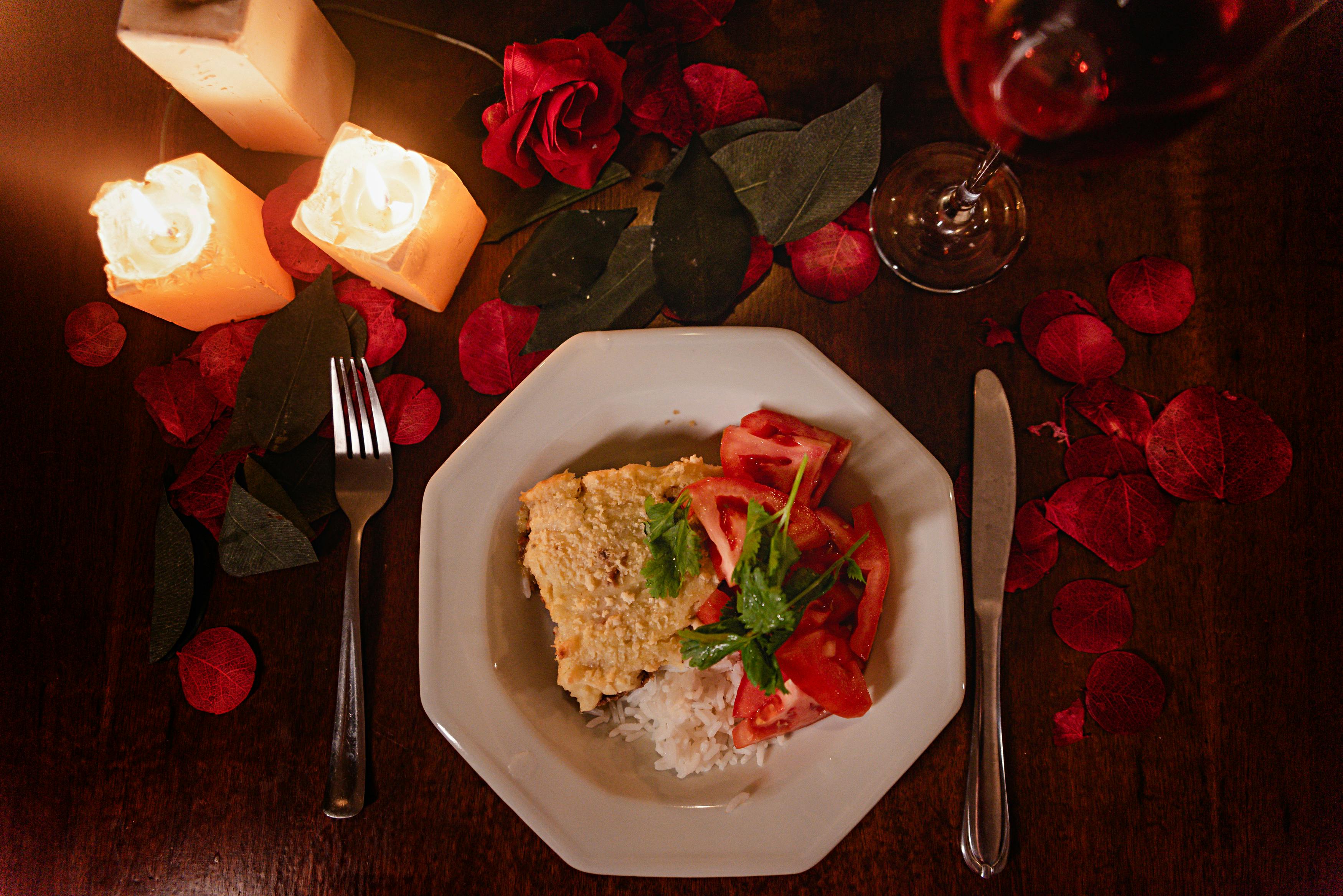 Roses Petals and Candles around Meal · Free Stock Photo