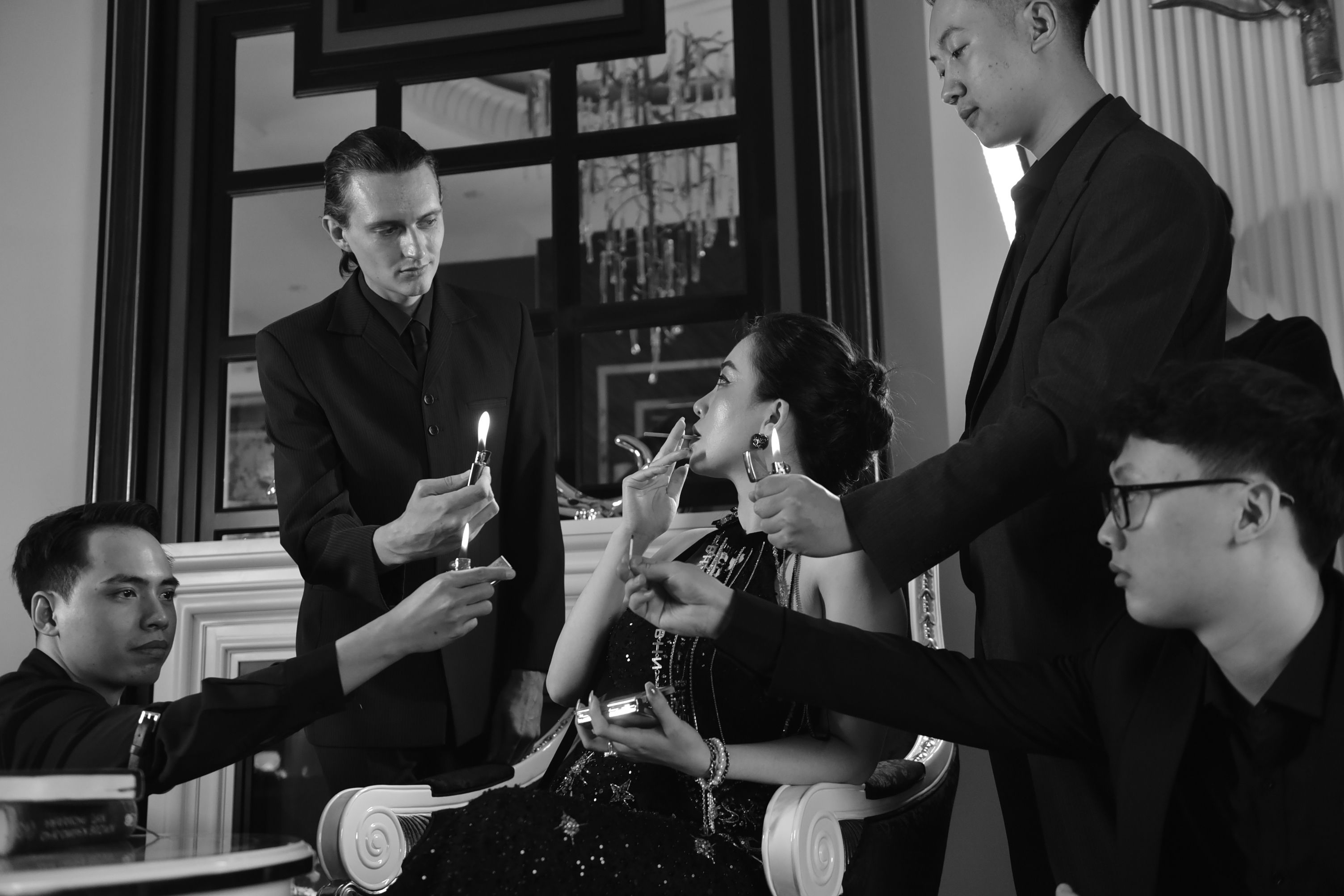 Men Offering a Light to Woman with Cigarette · Free Stock Photo