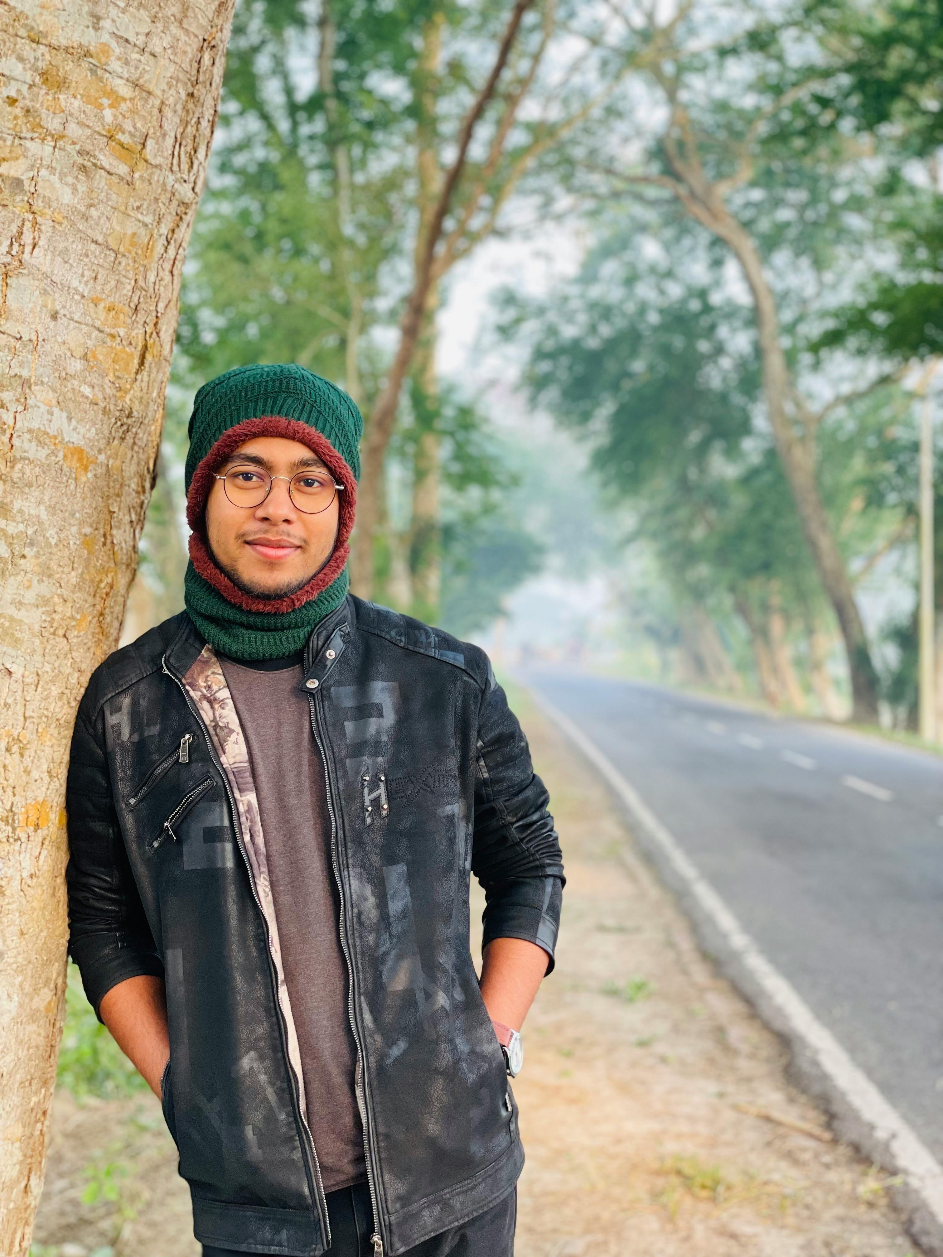 Man in Hat and Jacket Standing by Road · Free Stock Photo