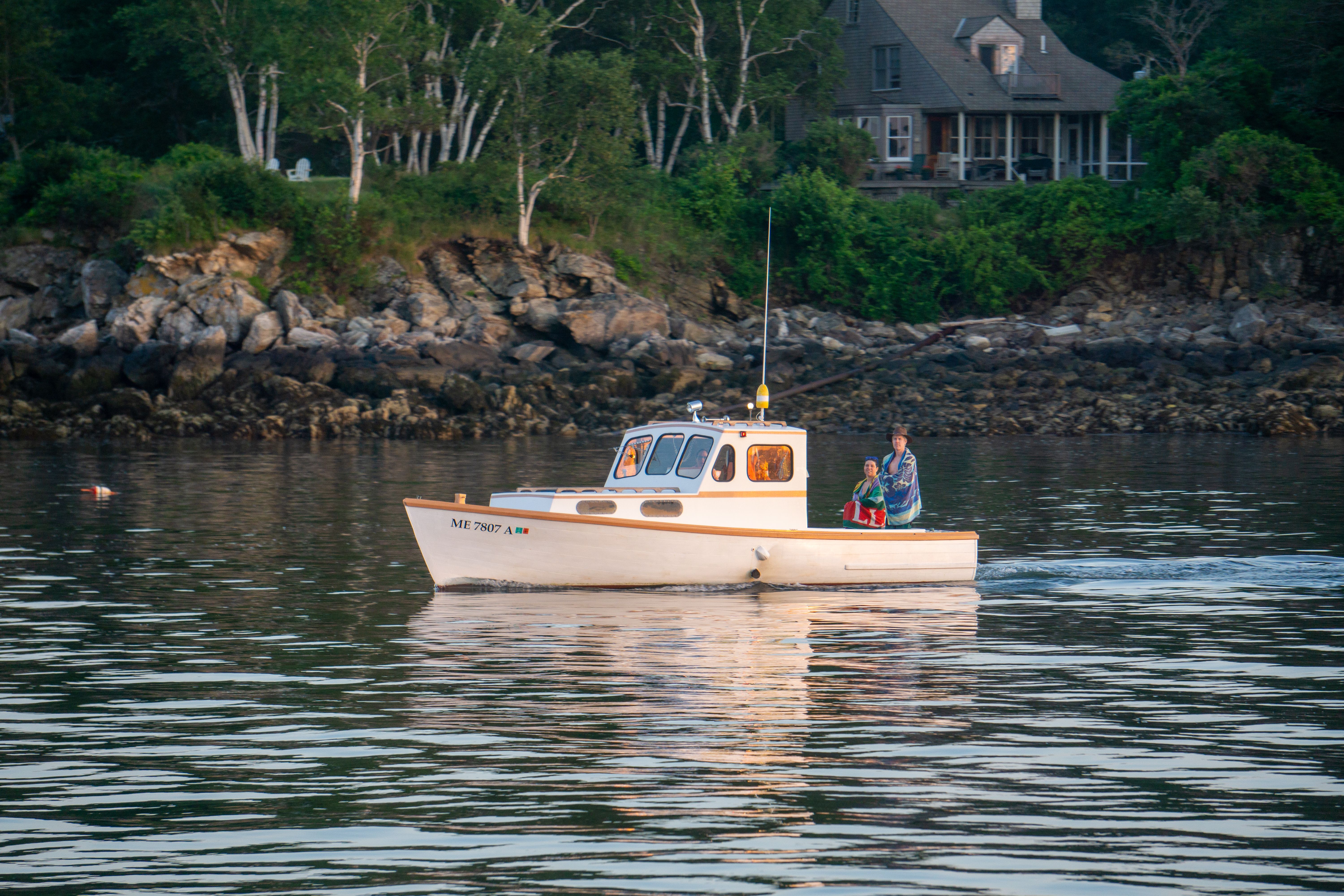 People Relaxing on Boat · Free Stock Photo