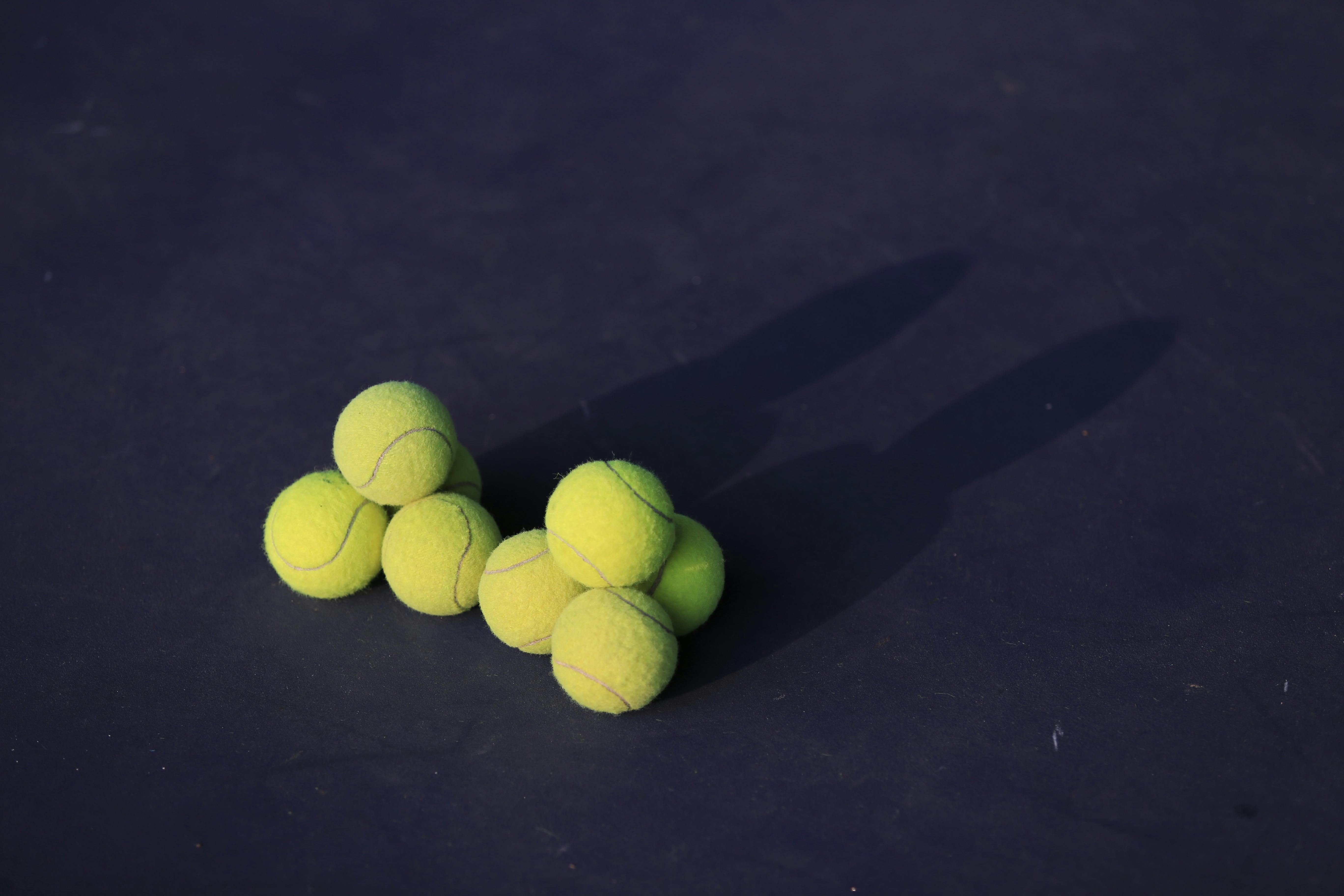 Tennis Balls on Ground · Free Stock Photo