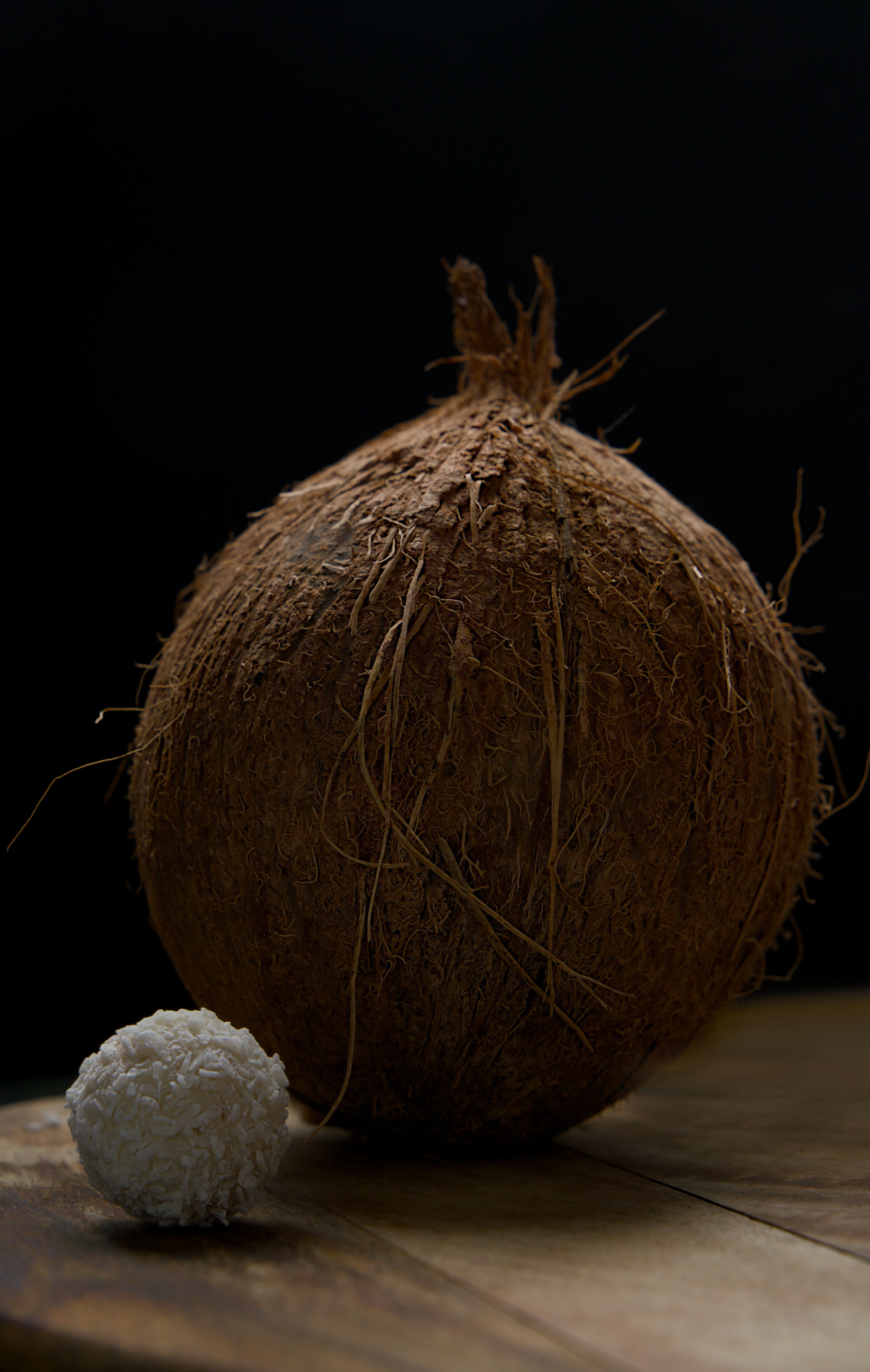 Still Life with a Coconut and a Coconut Sweet · Free Stock Photo