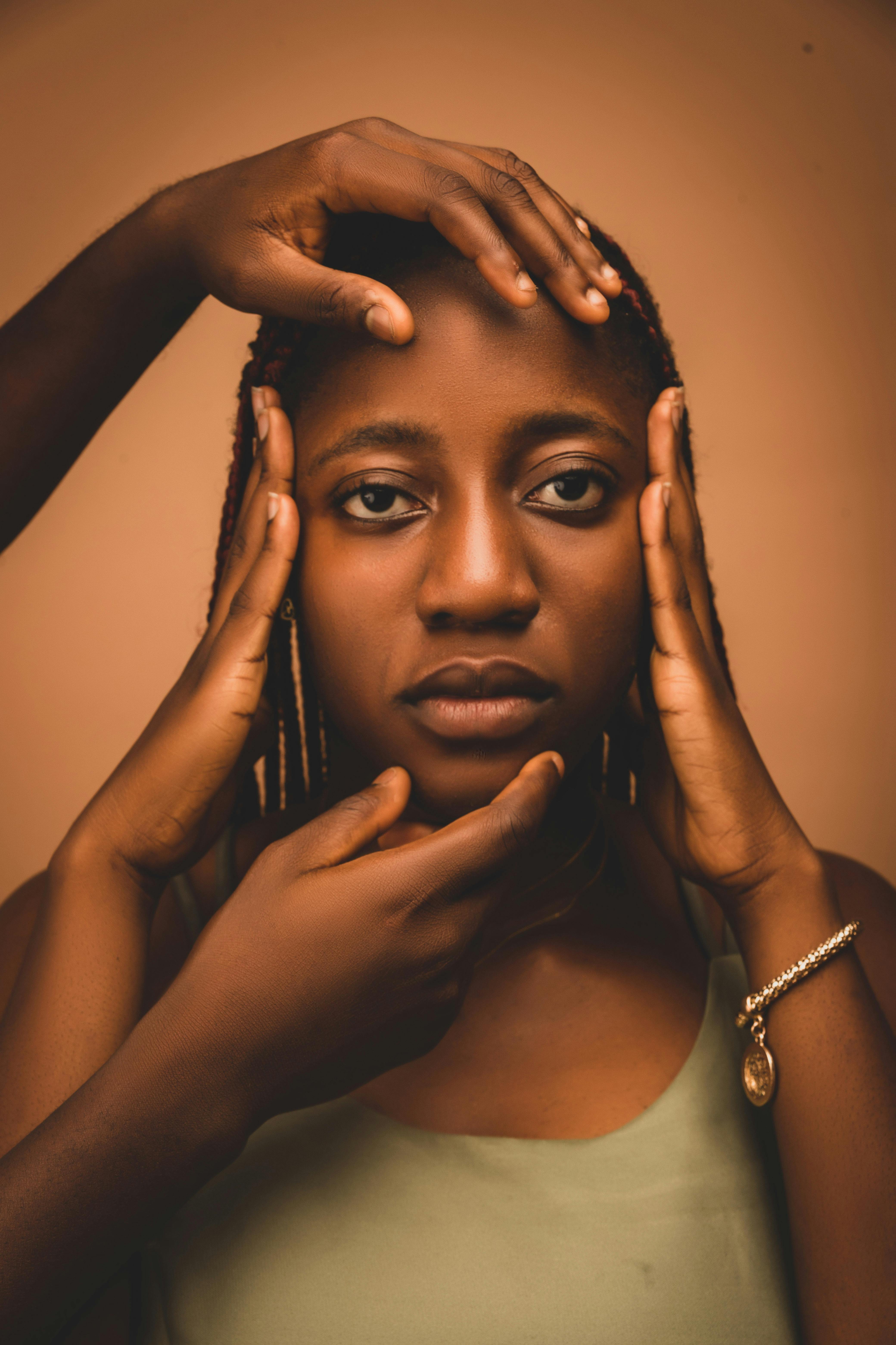 Hands around Woman Face · Free Stock Photo