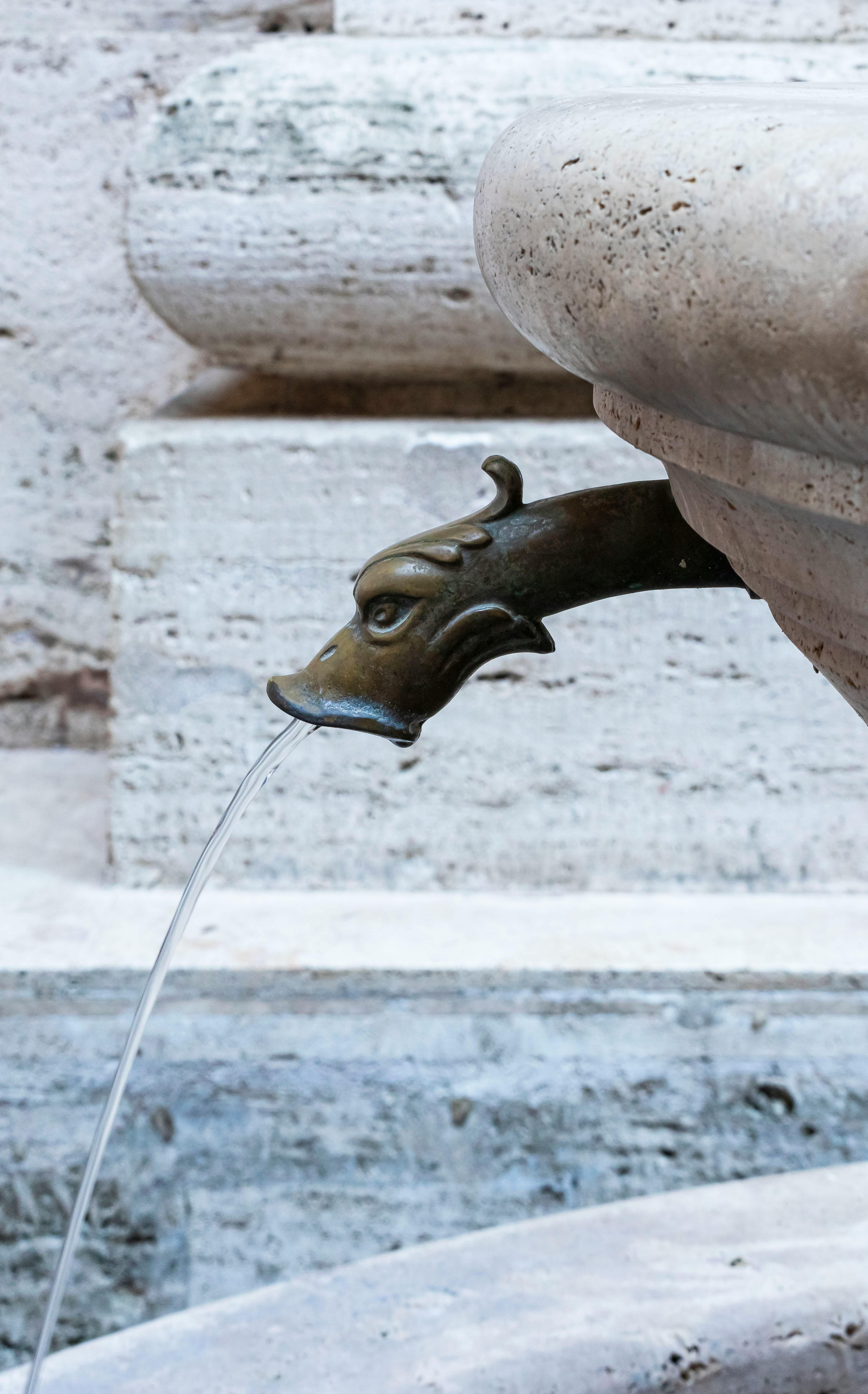 Water Flowing Out of Fountain · Free Stock Photo