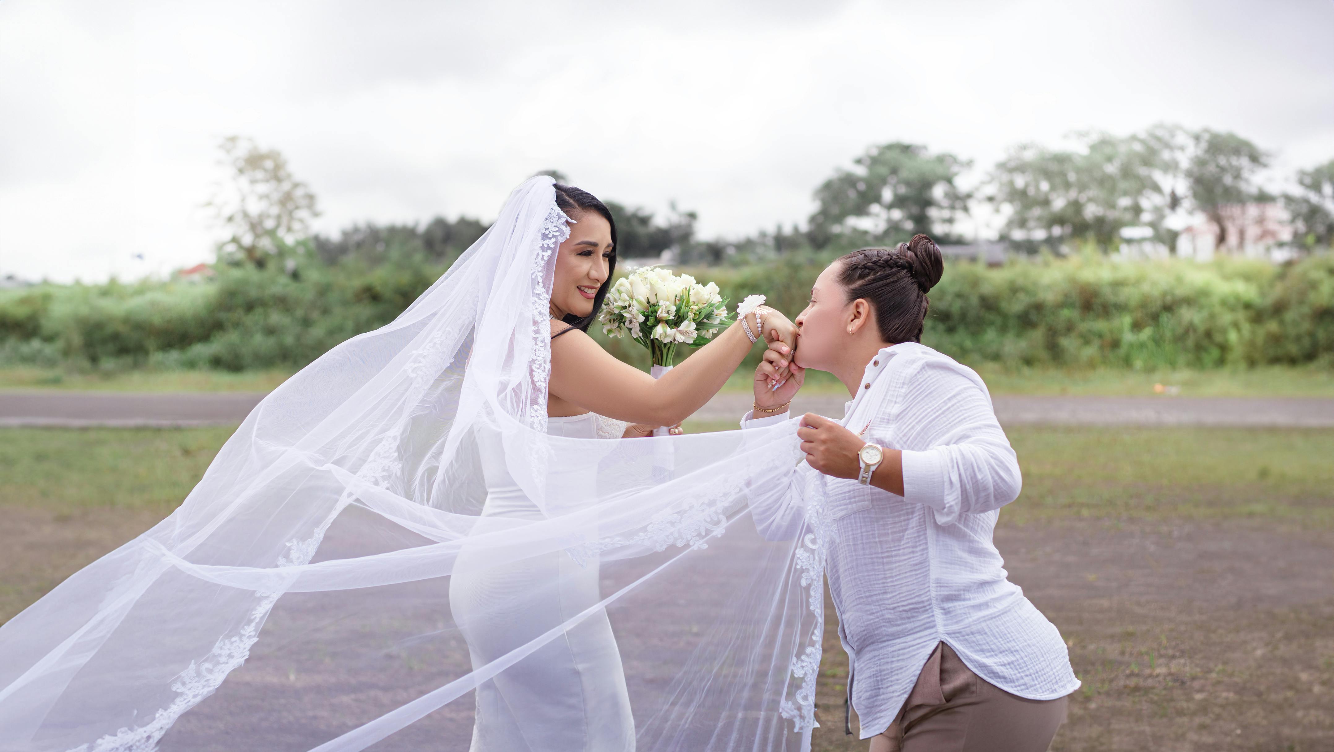 Bridesmaid Kissing Bride Hand · Free Stock Photo