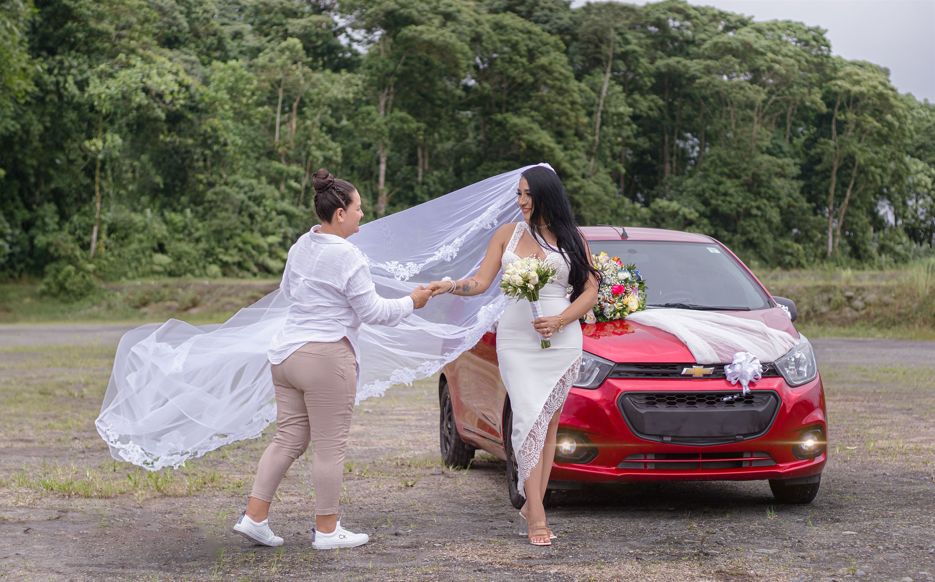 Bride Sitting in Retro Car at Wedding · Free Stock Photo