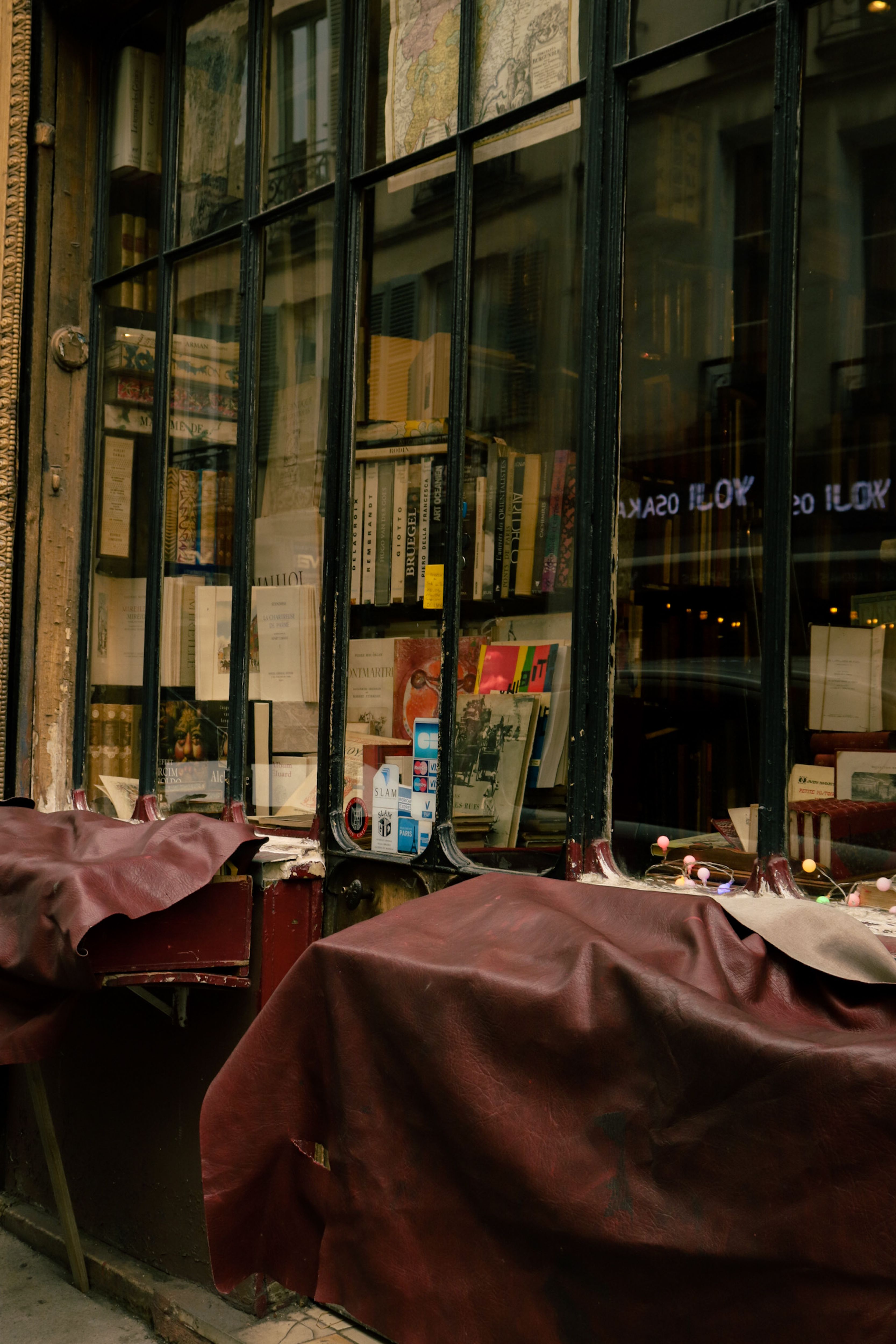 A window with a table and chairs in front of it · Free Stock Photo