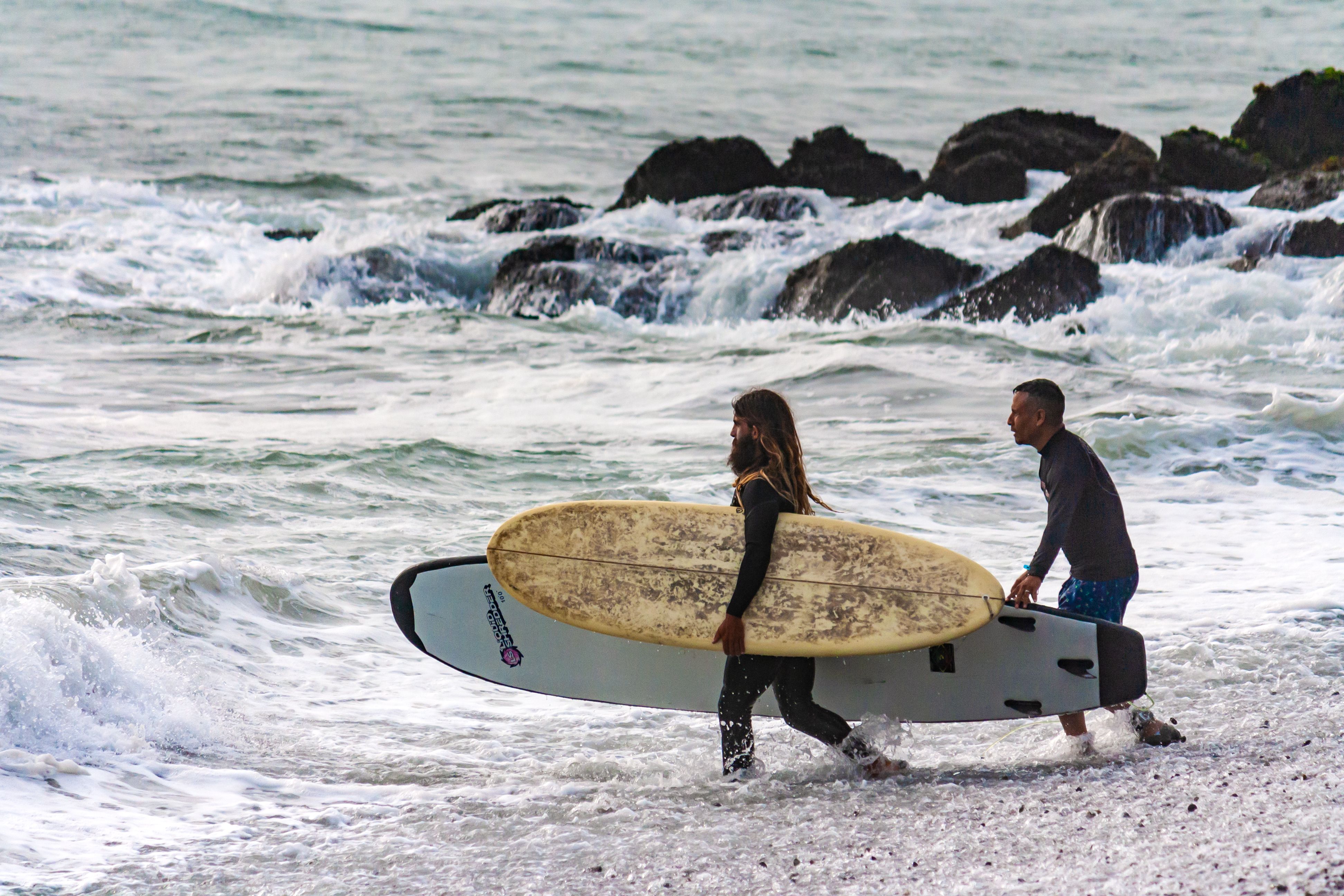 Men with Surfboards on Beach · Free Stock Photo