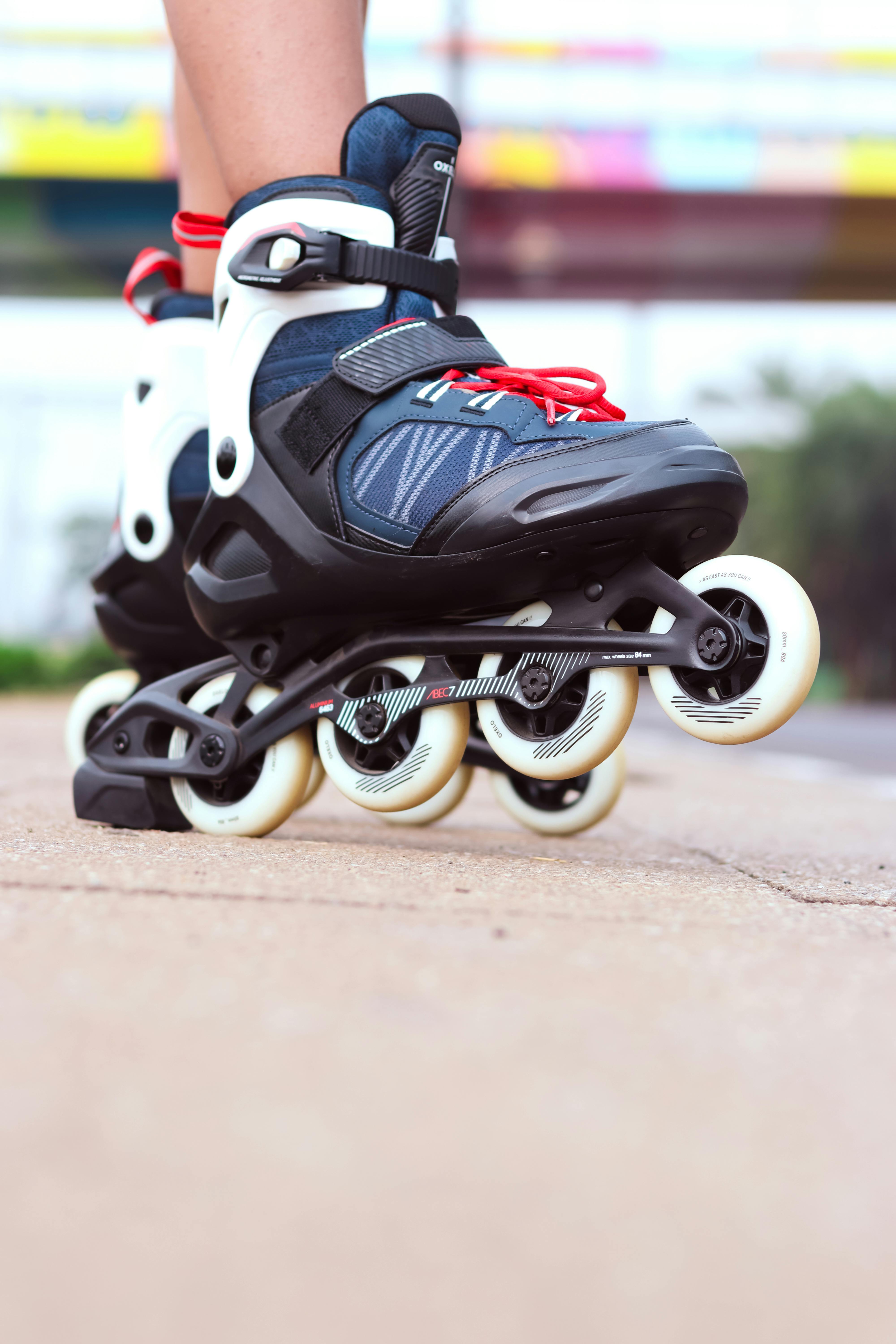 Child Riding on Rollerblades · Free Stock Photo