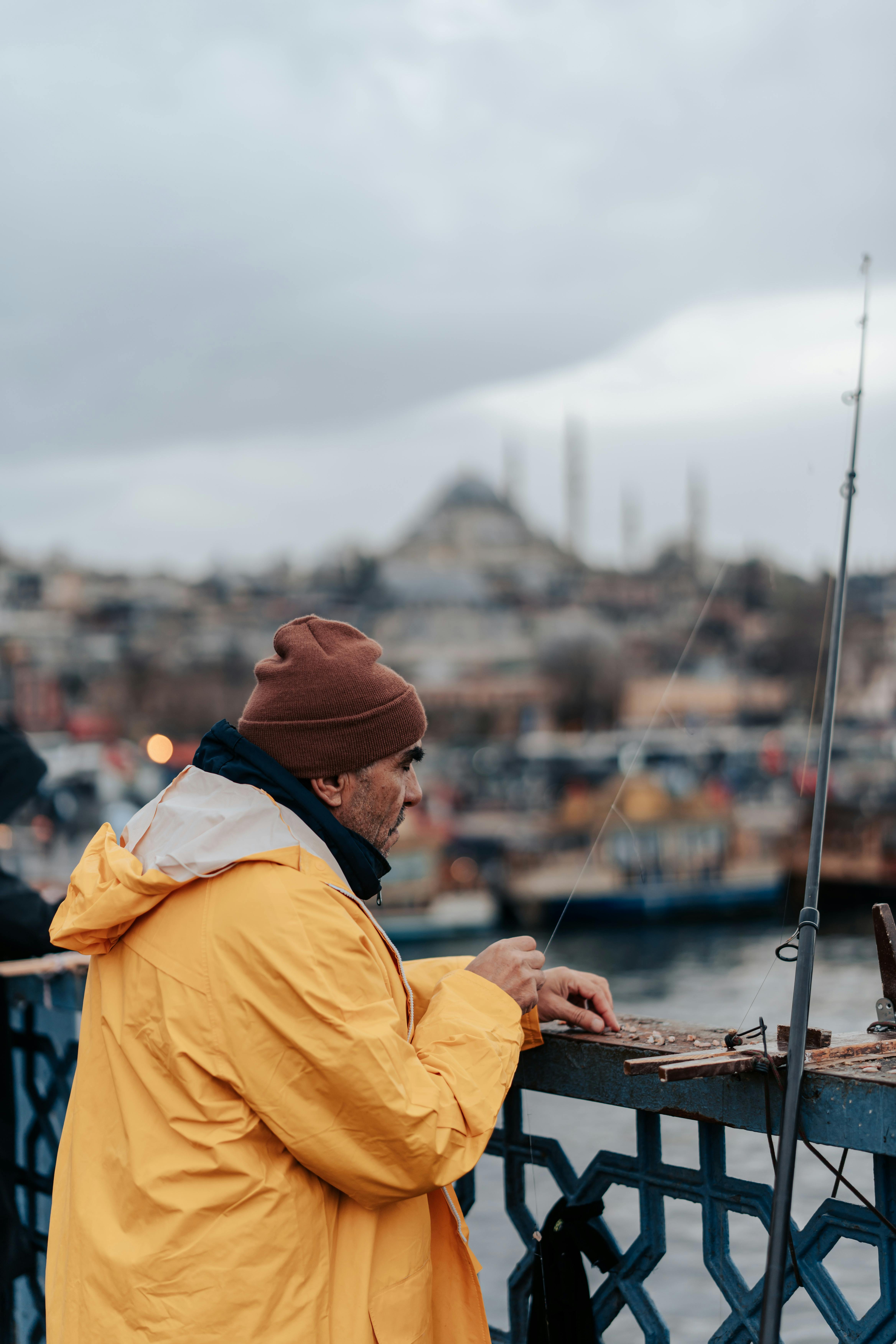 Man Wearing Yellow Jacket in Port in Istanbul · Free Stock Photo