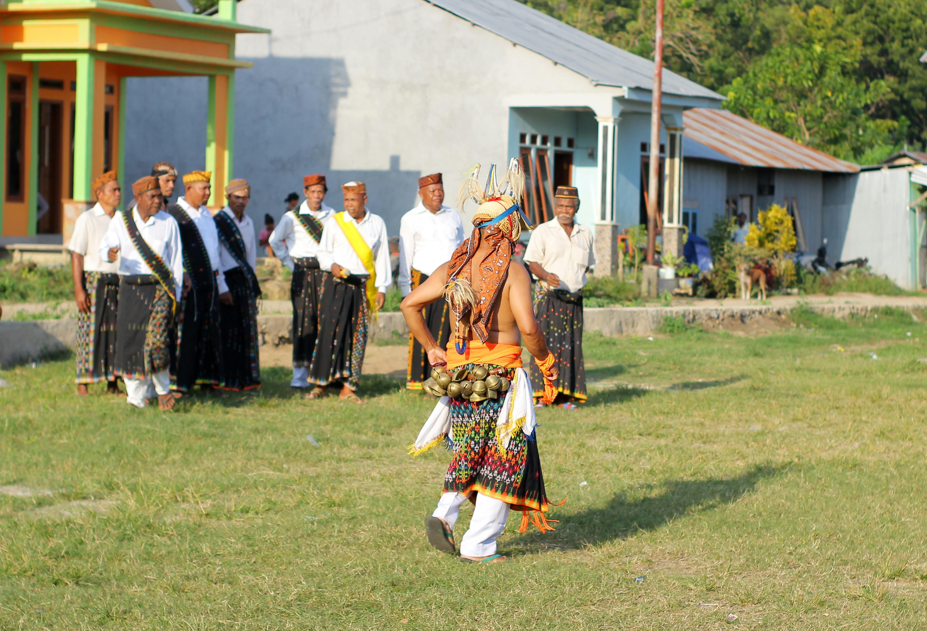 A Group of People in a Field · Free Stock Photo
