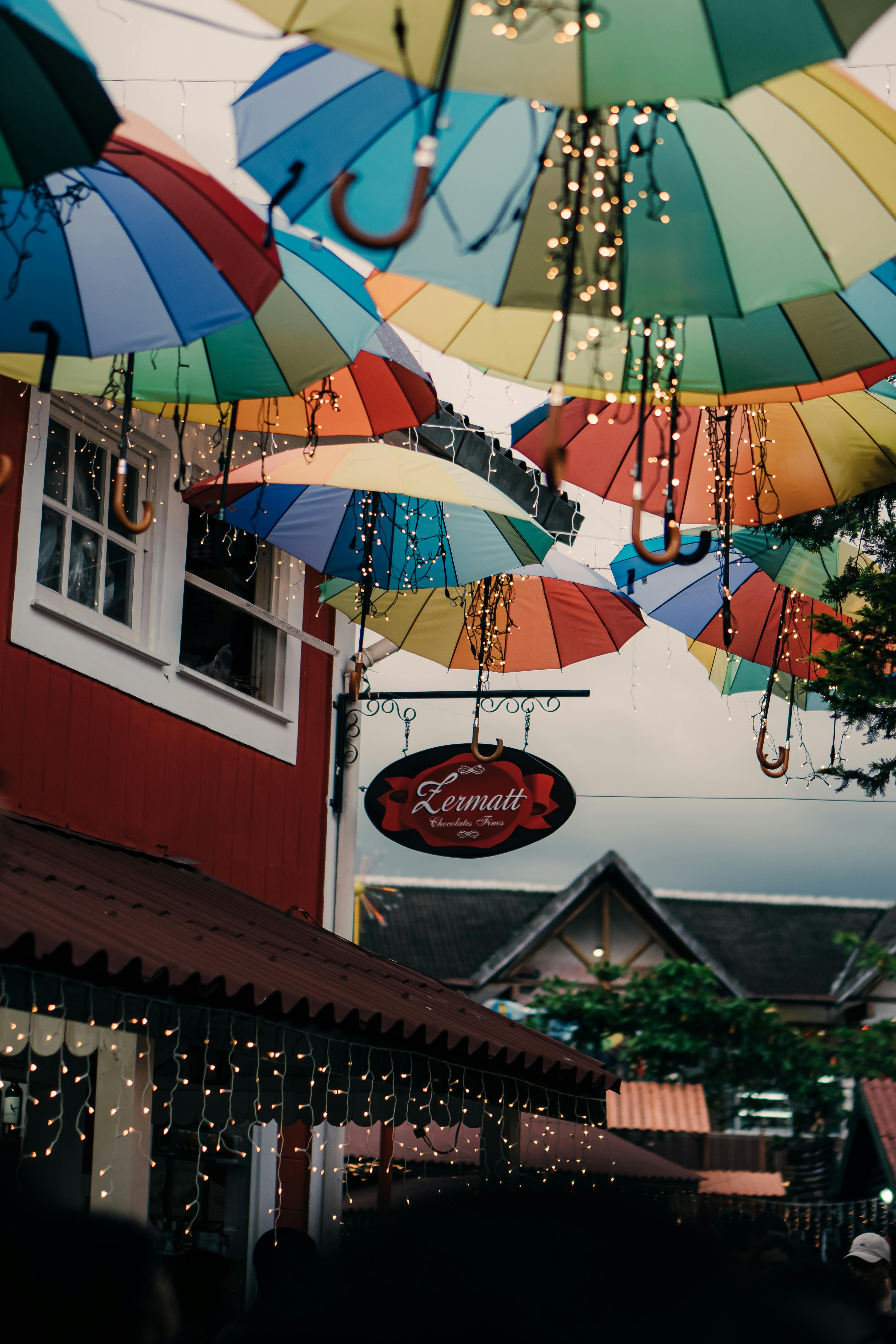 Decoration Above an Alley with Colorful Umbrellas and String Lights ...