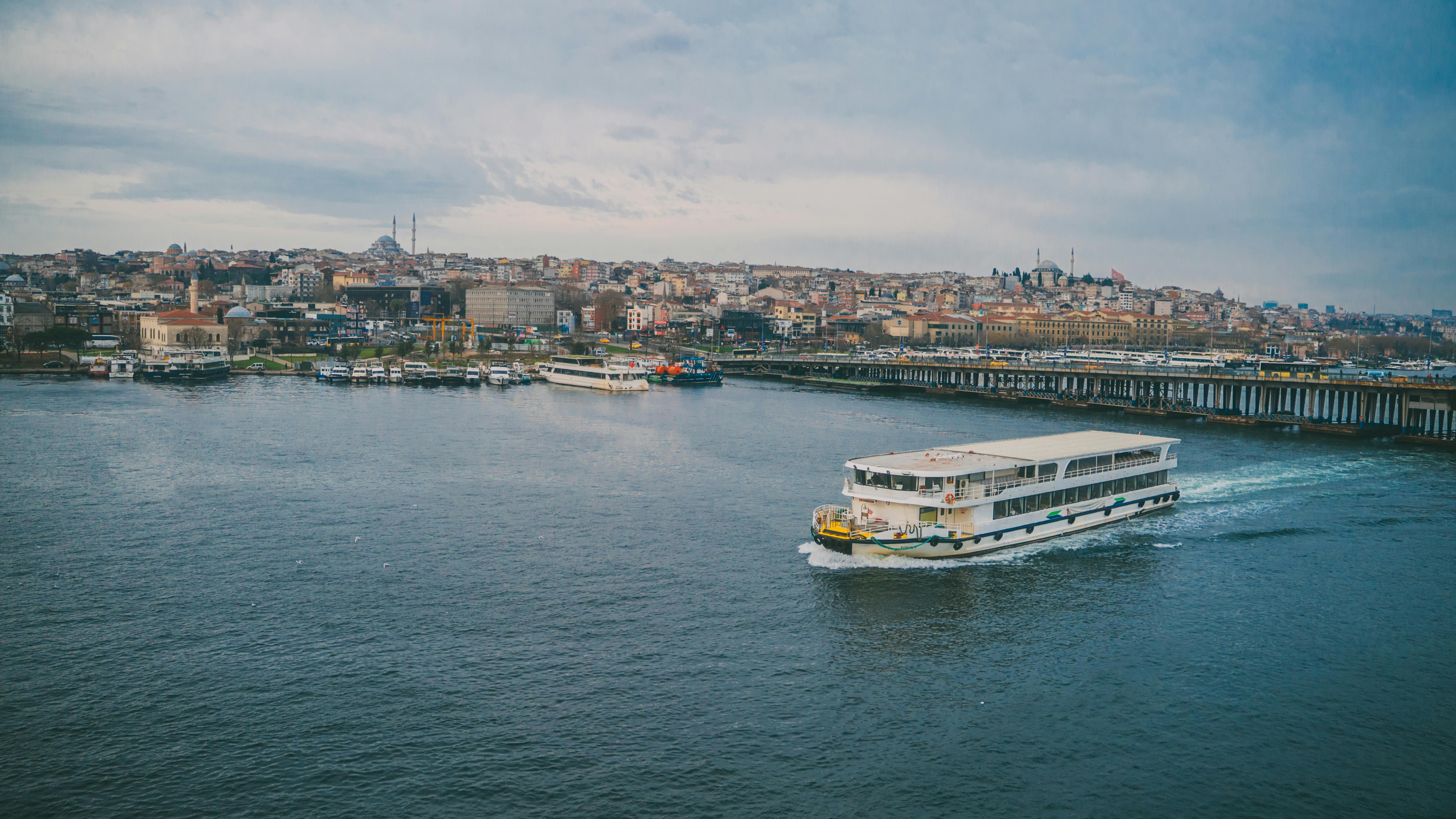 Istanbul Waterfront and a Ferry on the Bosphorus Strait · Free Stock Photo