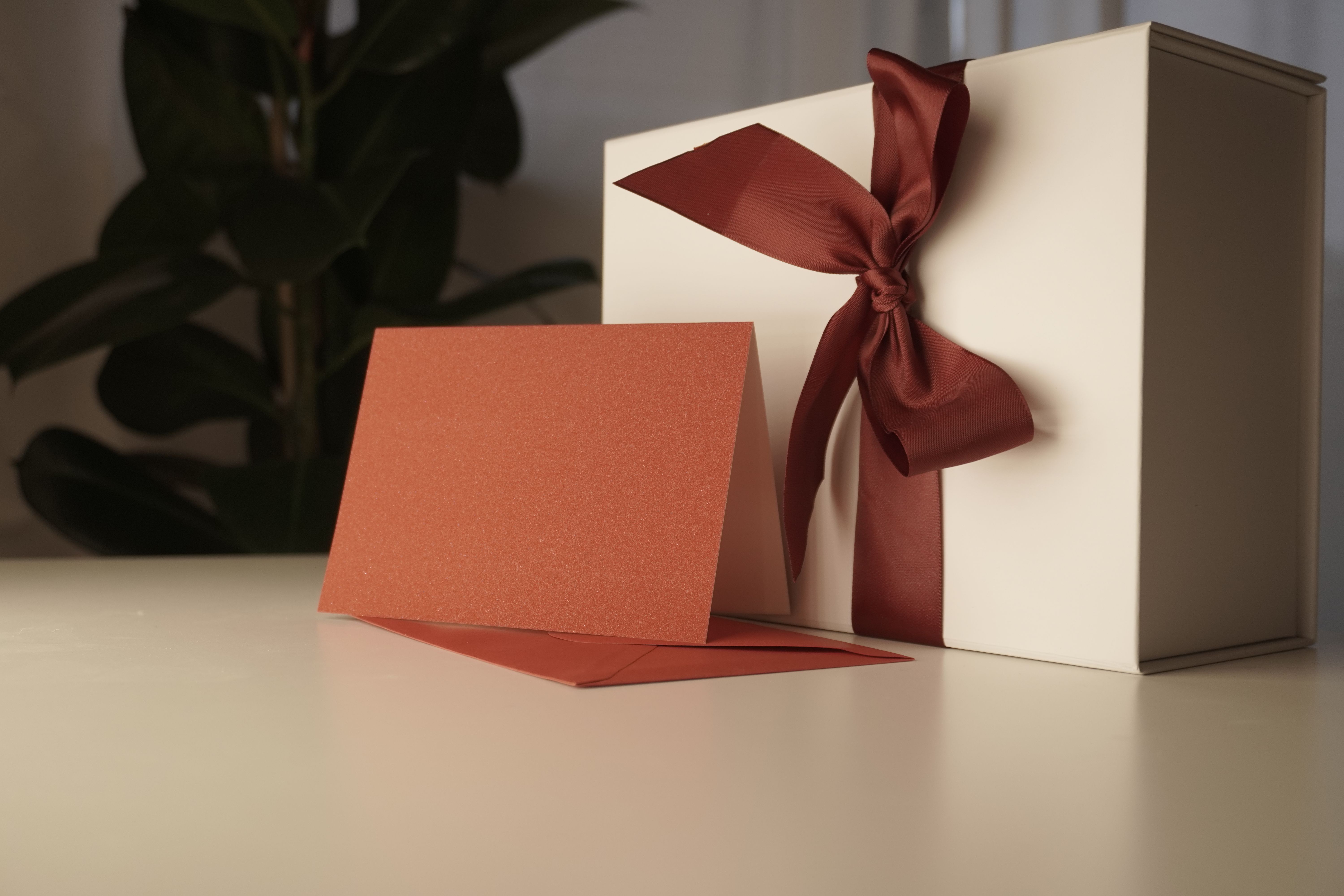 Pink carton gift box on table · Free Stock Photo