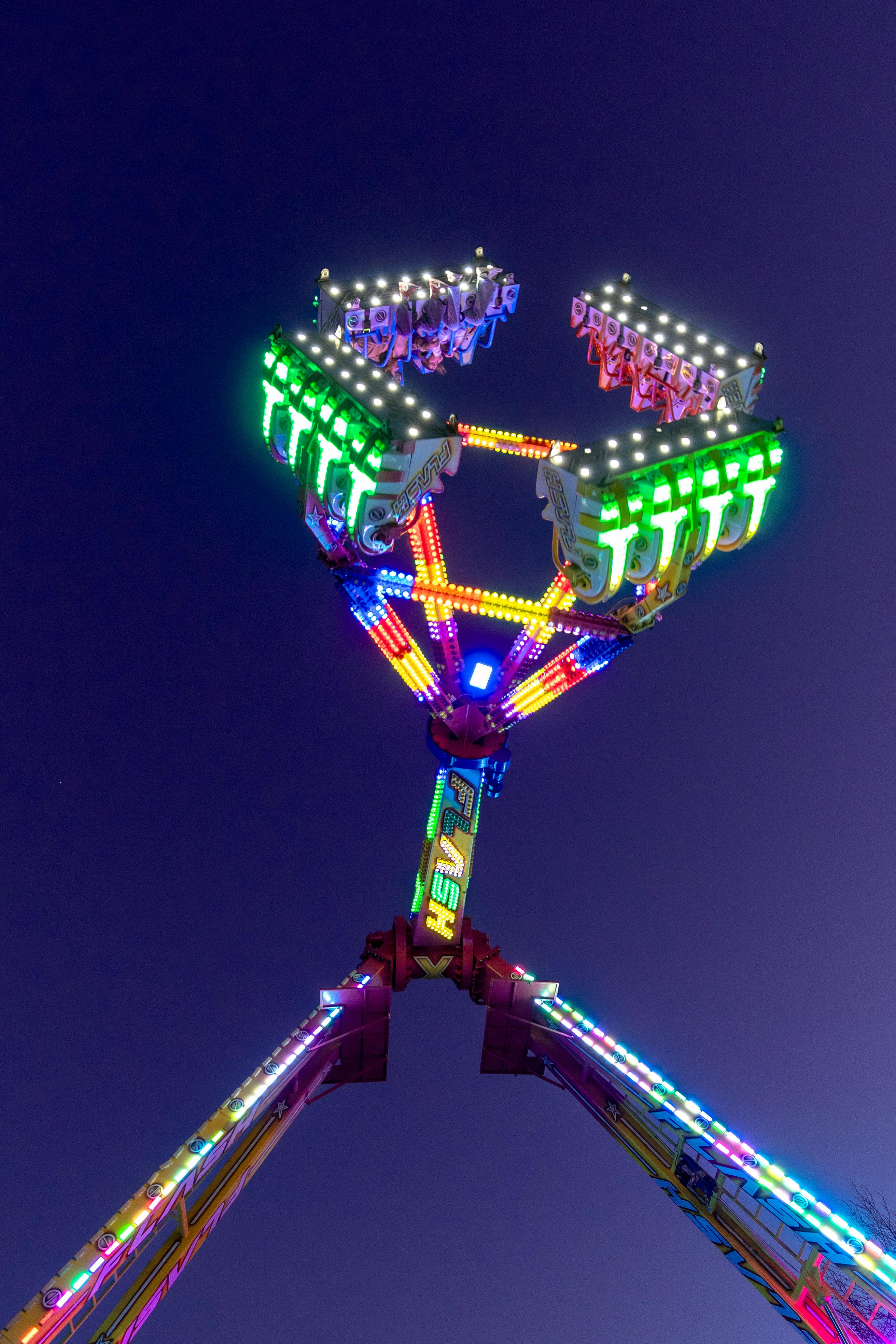 Funfair Ride Illuminated in the Evening · Free Stock Photo