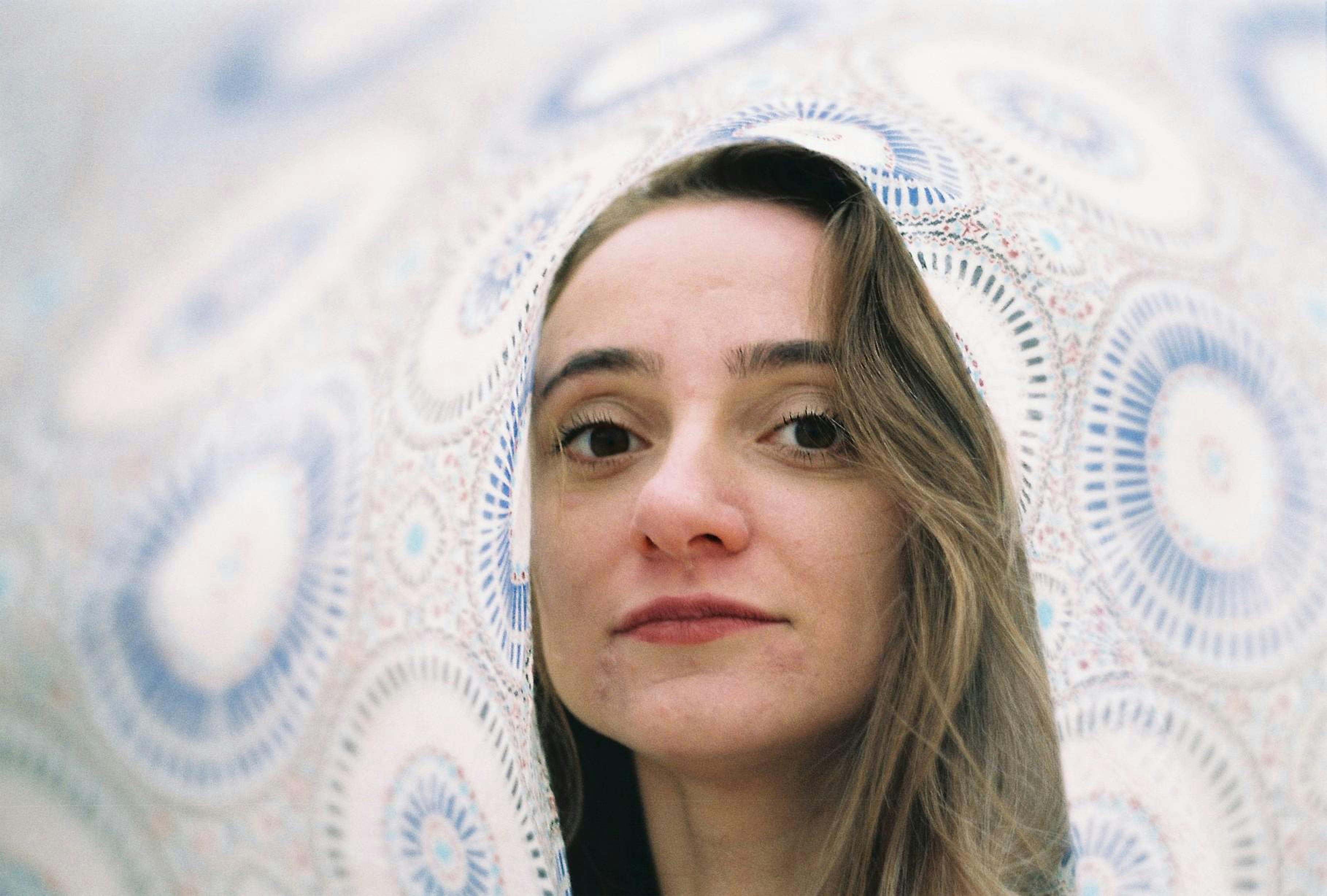 Woman Face under Cloth with Design · Free Stock Photo