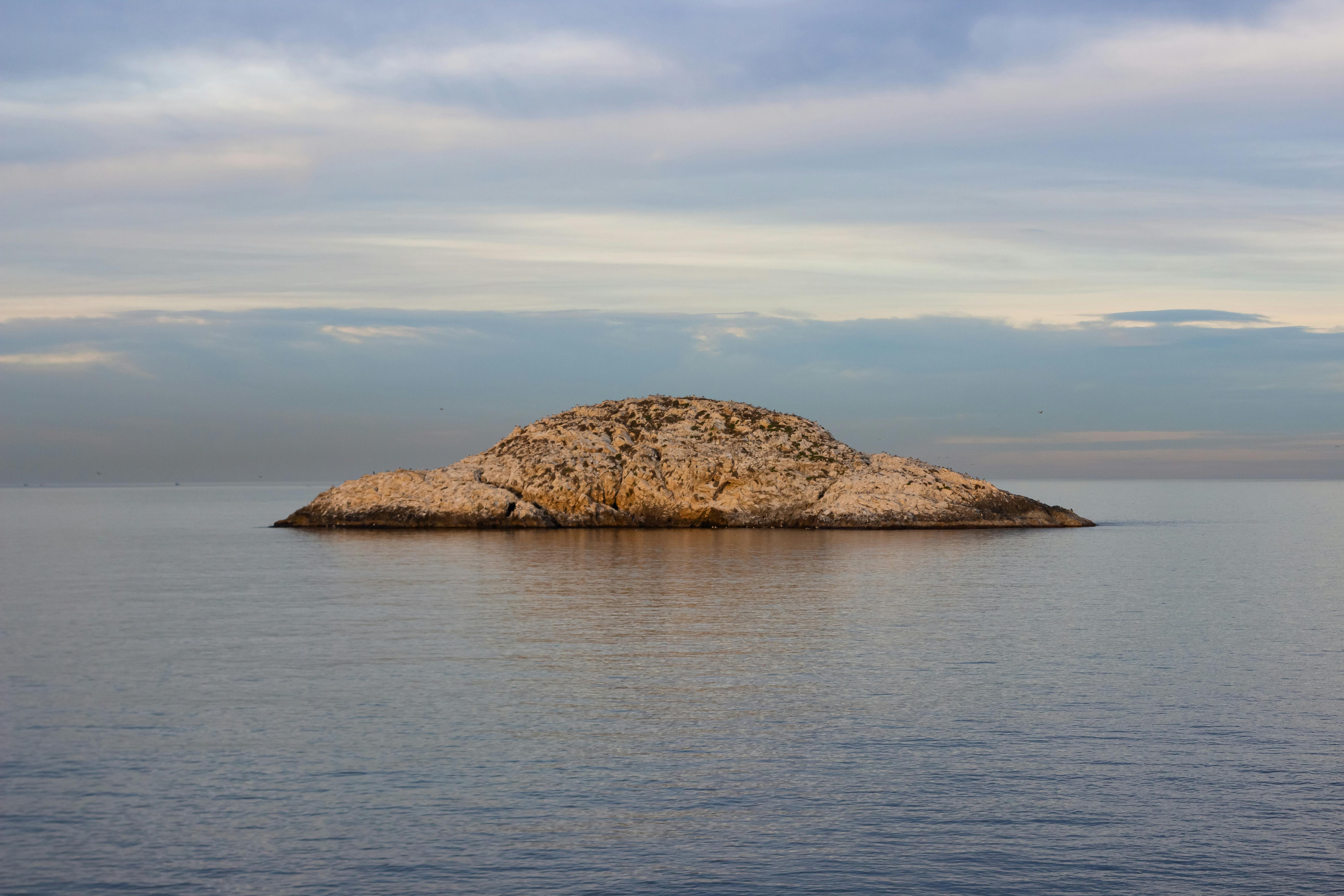islet surround with body of water · Free Stock Photo