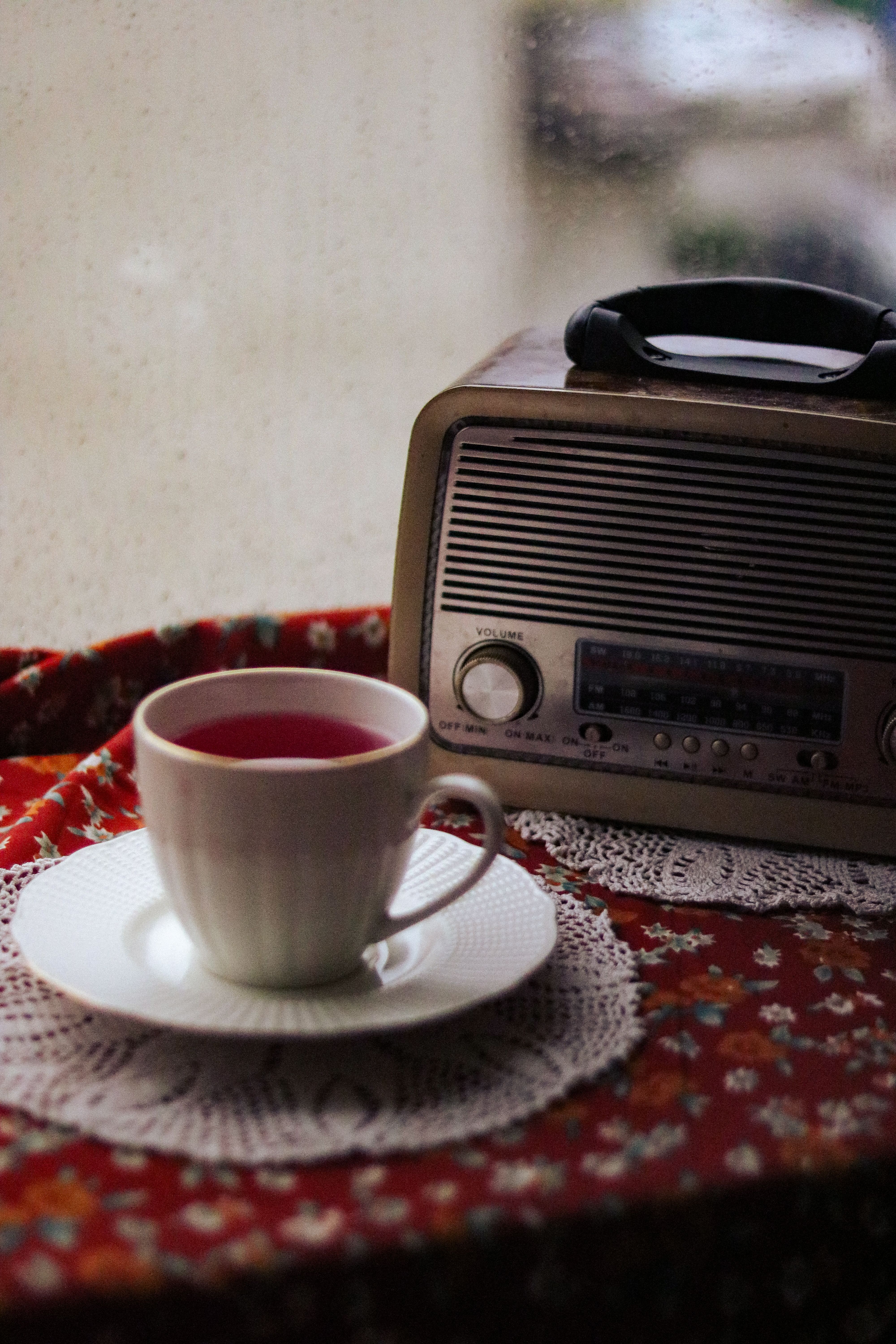 Cup of Tea near Vintage Radio · Free Stock Photo