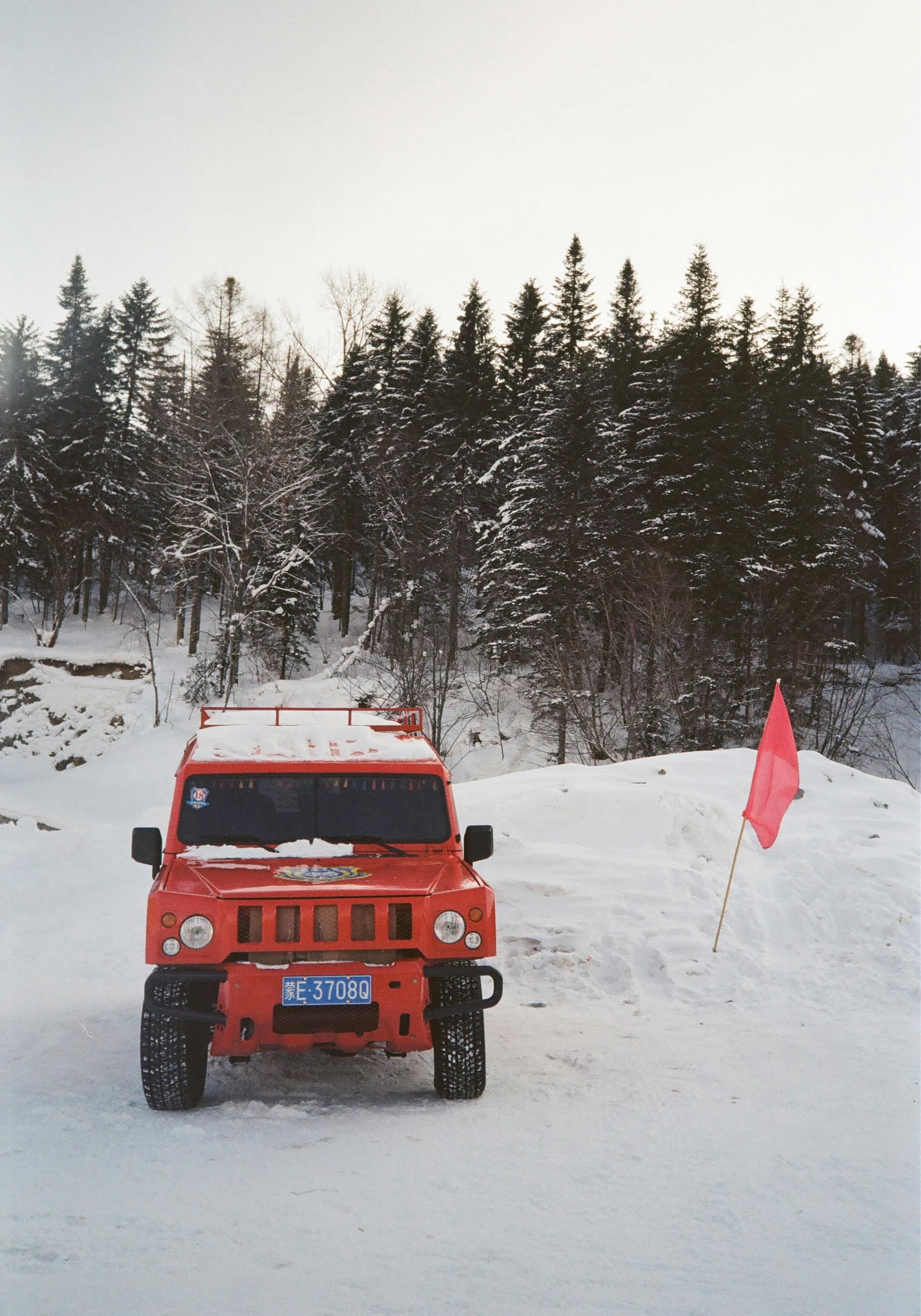 Red 4x4 in Snow in Winter · Free Stock Photo
