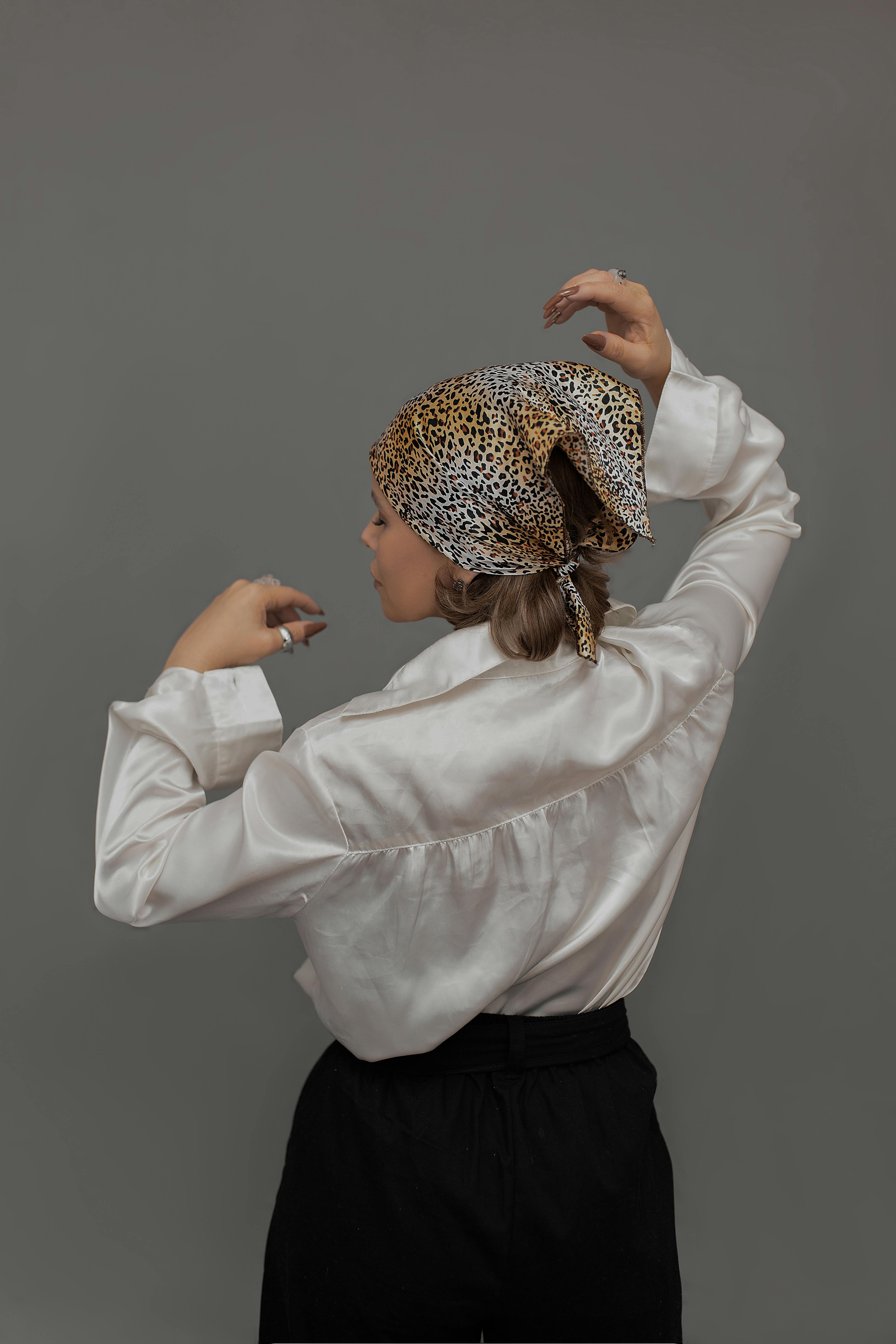 Woman in Handkerchief on Head Dancing in Studio · Free Stock Photo
