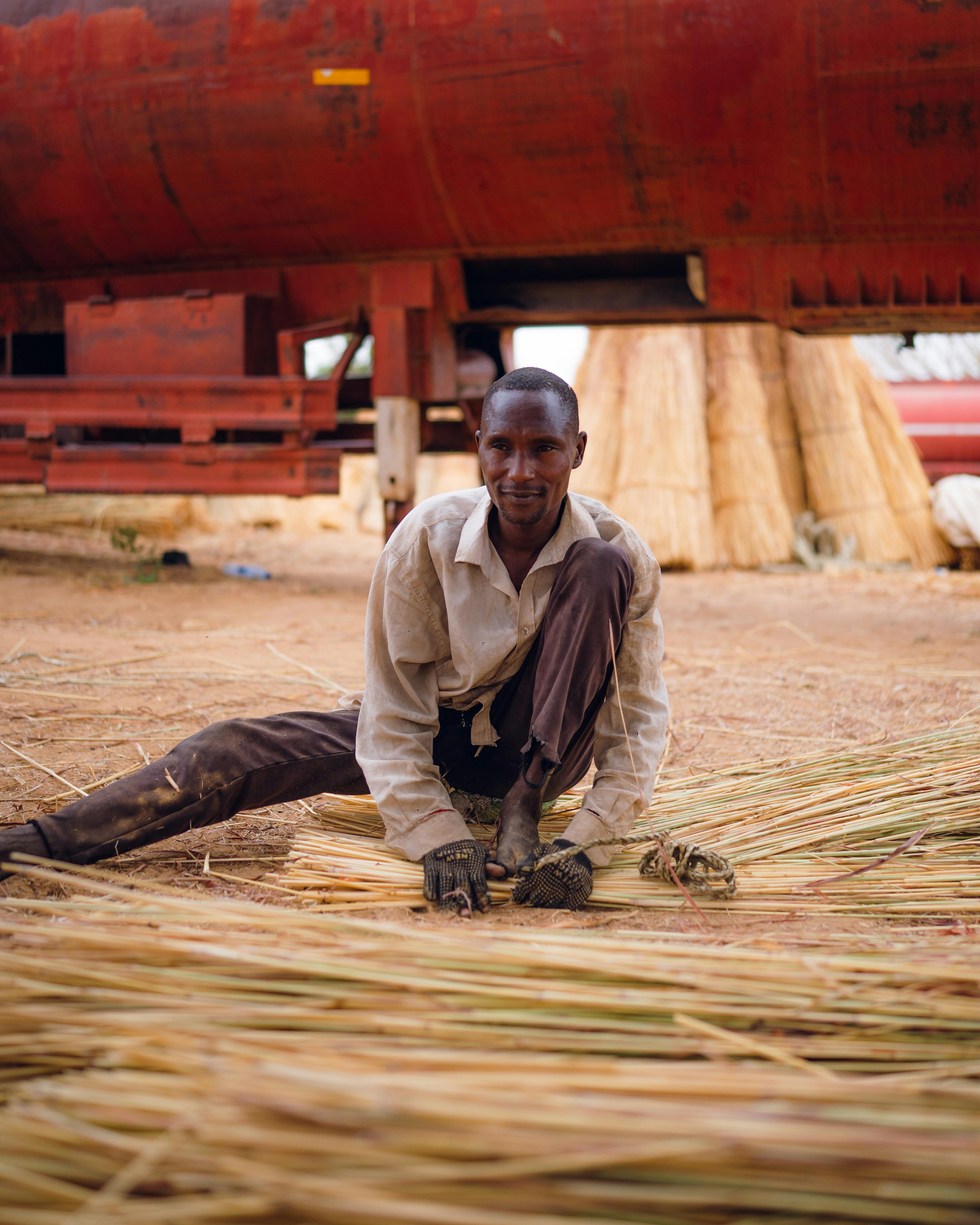 Black Man Working on Bamboo Farm · Free Stock Photo