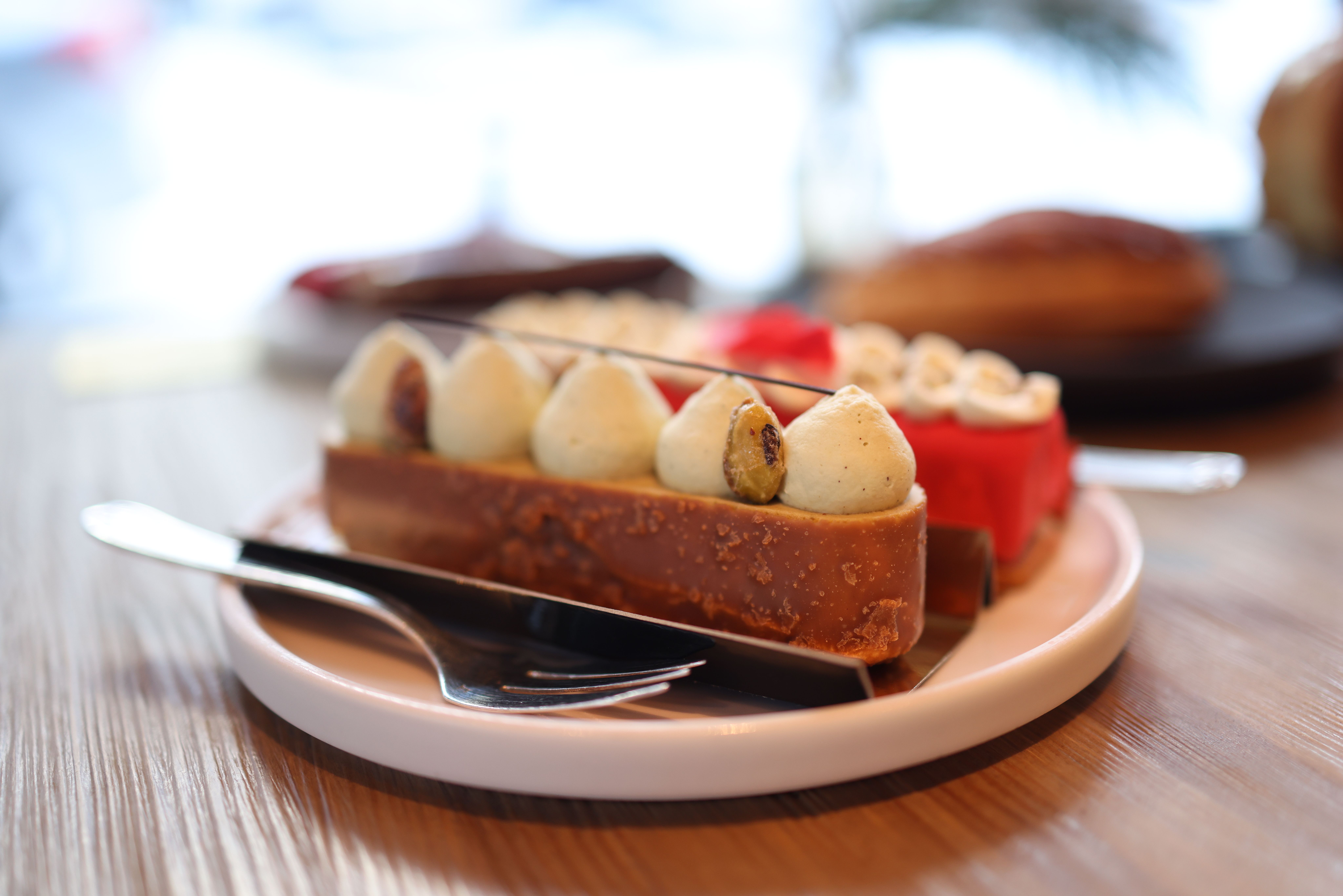 Decorated Pastry Dessert on a Plate · Free Stock Photo