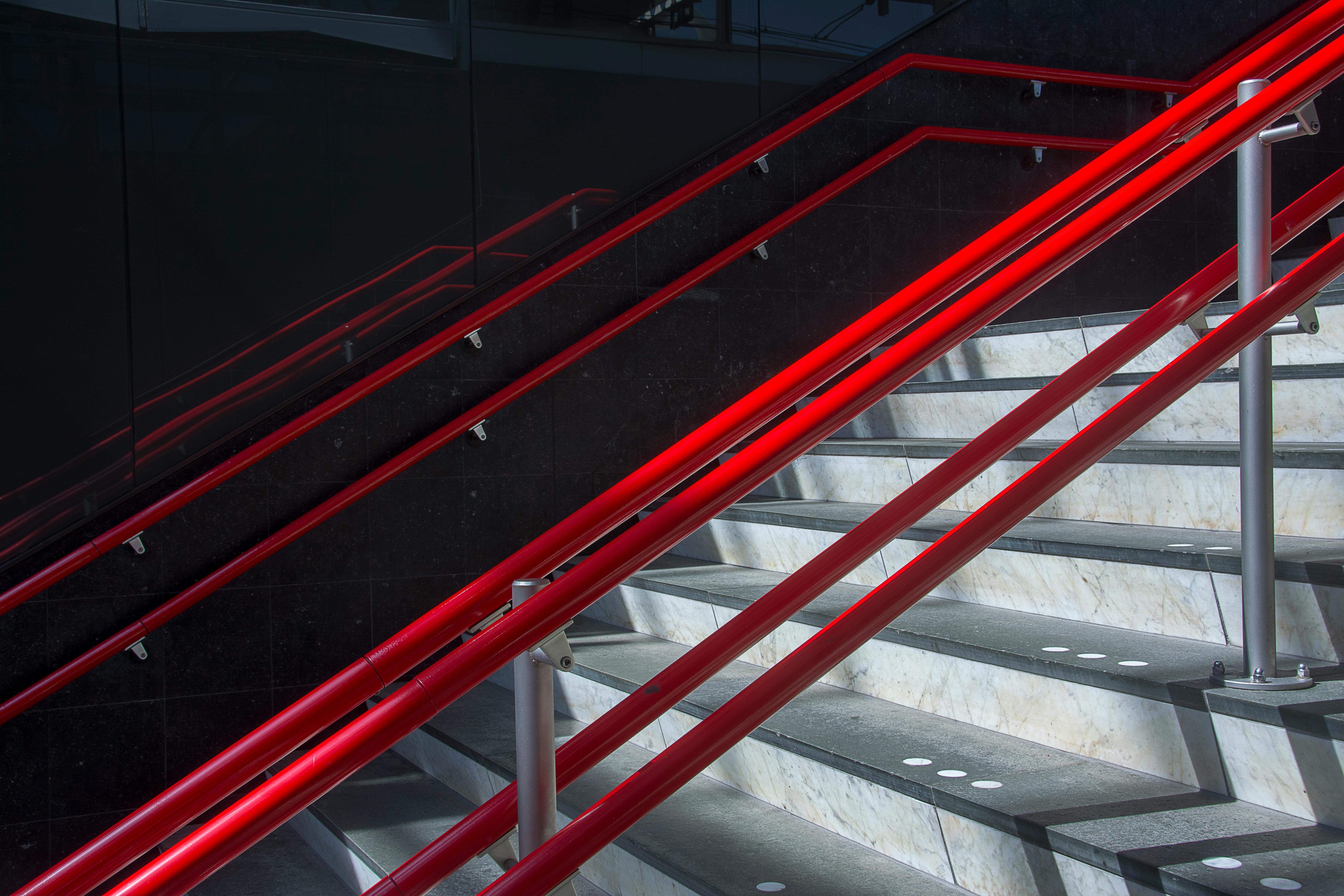 View of a Staircase with Red Handrail · Free Stock Photo