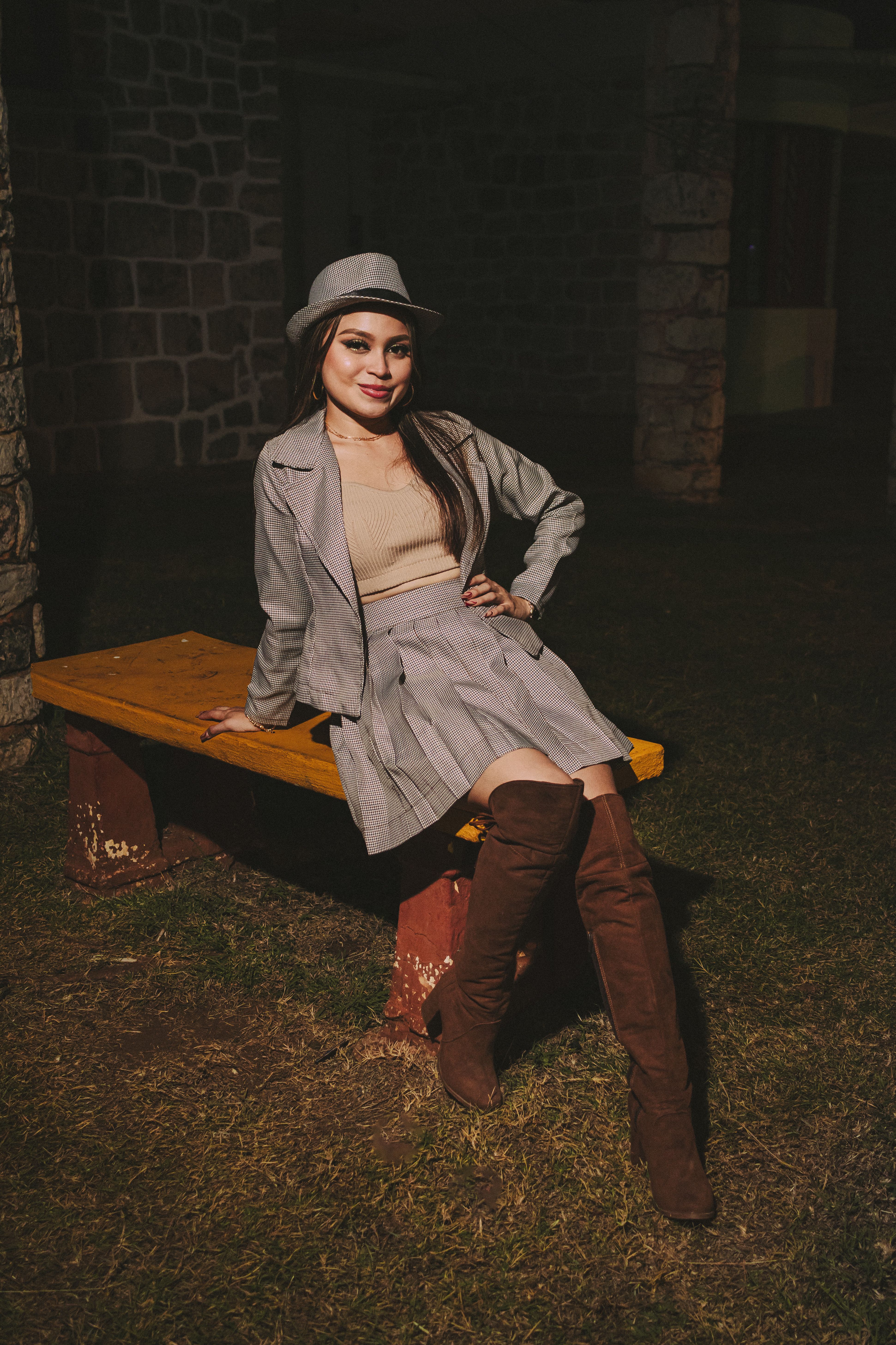 Model Posing on a Bench · Free Stock Photo