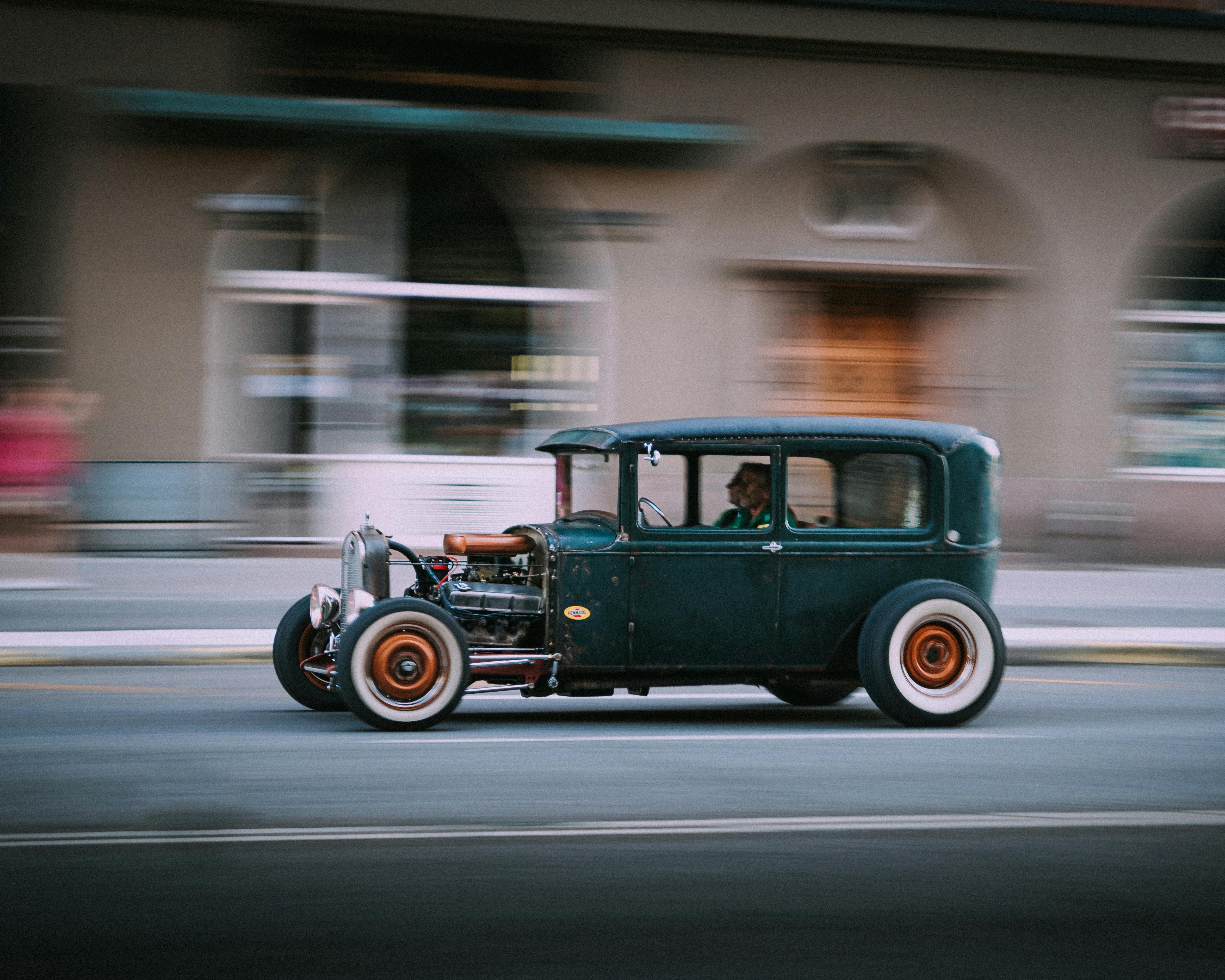 Retro Car on City Street · Free Stock Photo