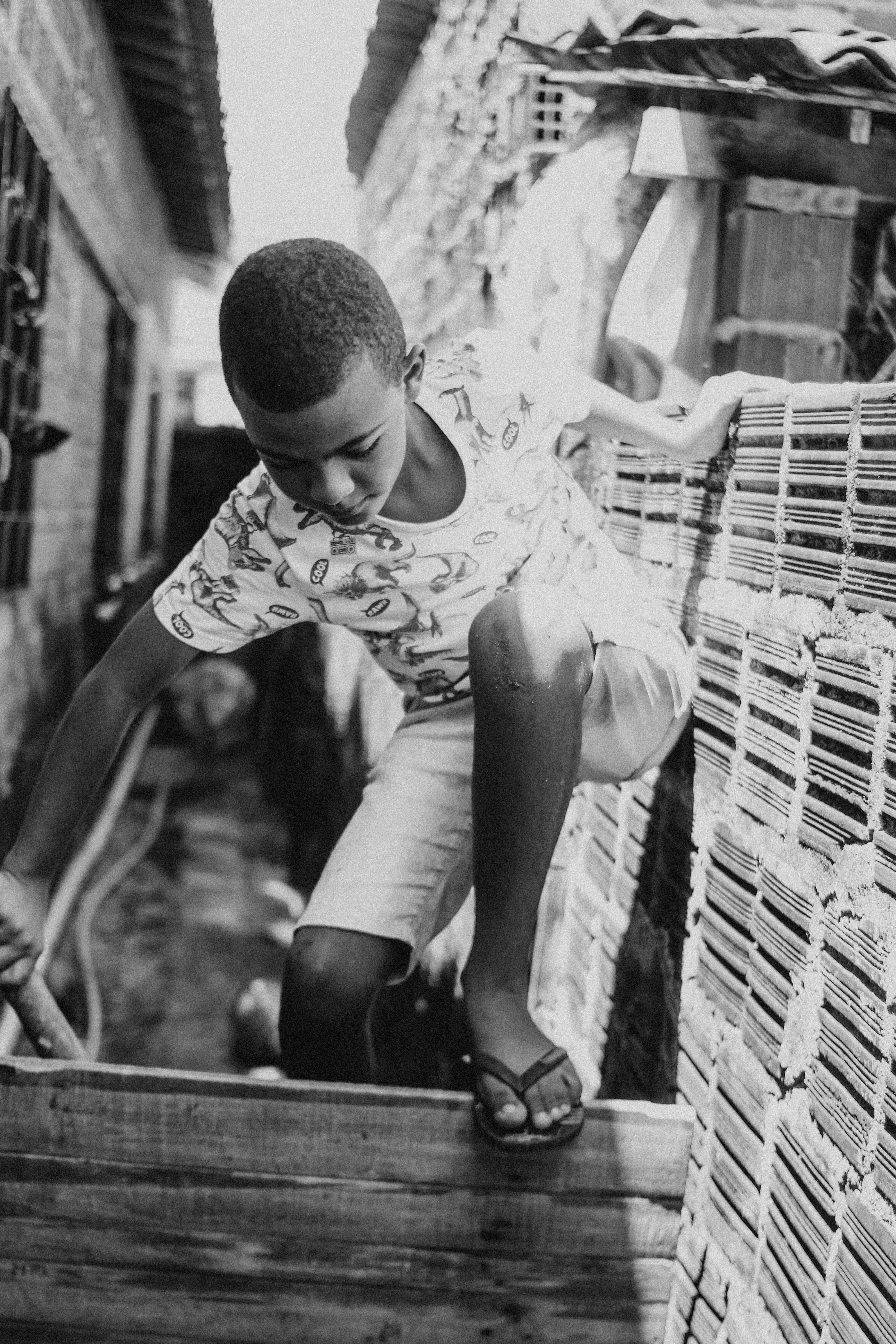 Boy Jumping Over a Fence · Free Stock Photo