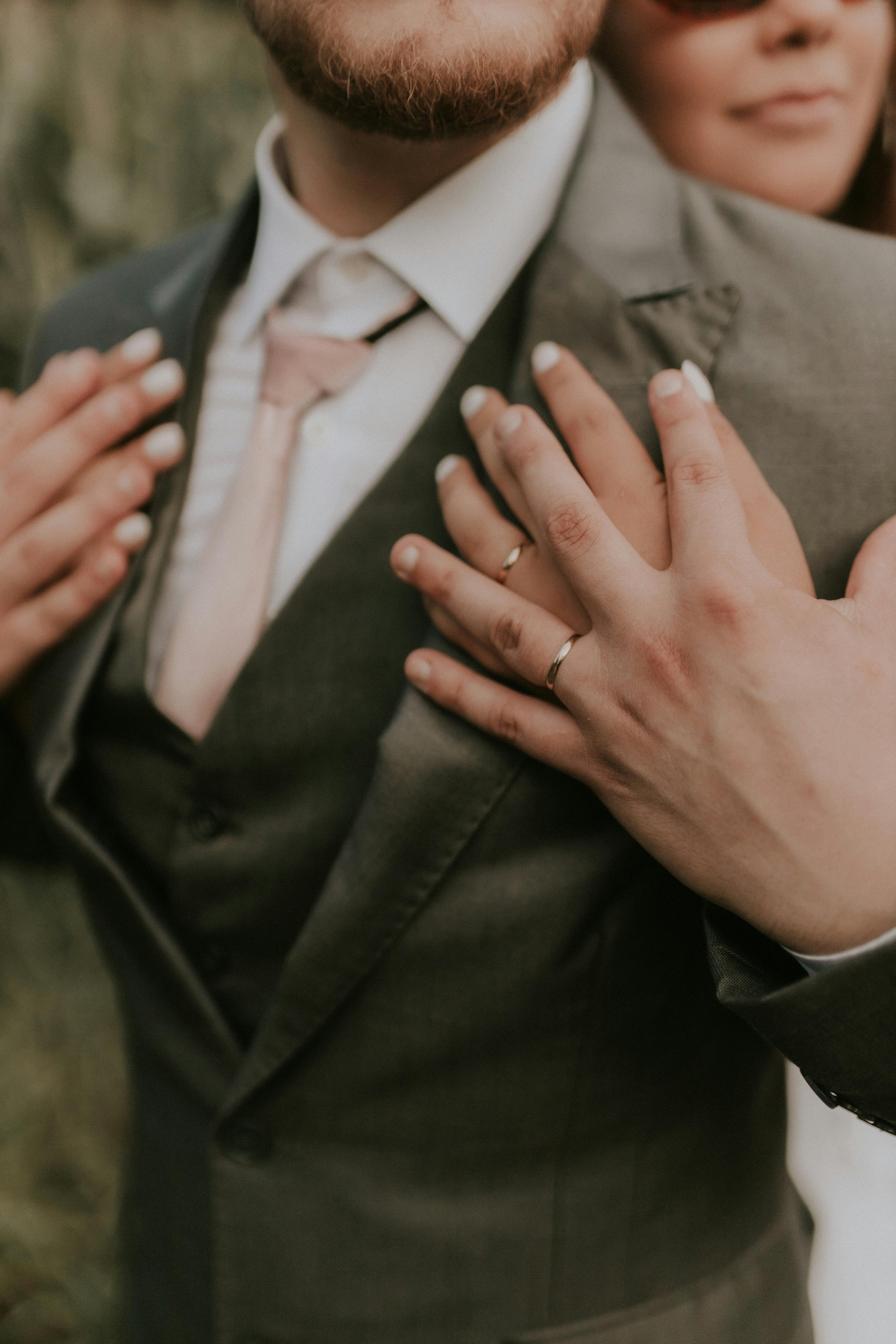 Newlywed Couple Touching Hands · Free Stock Photo