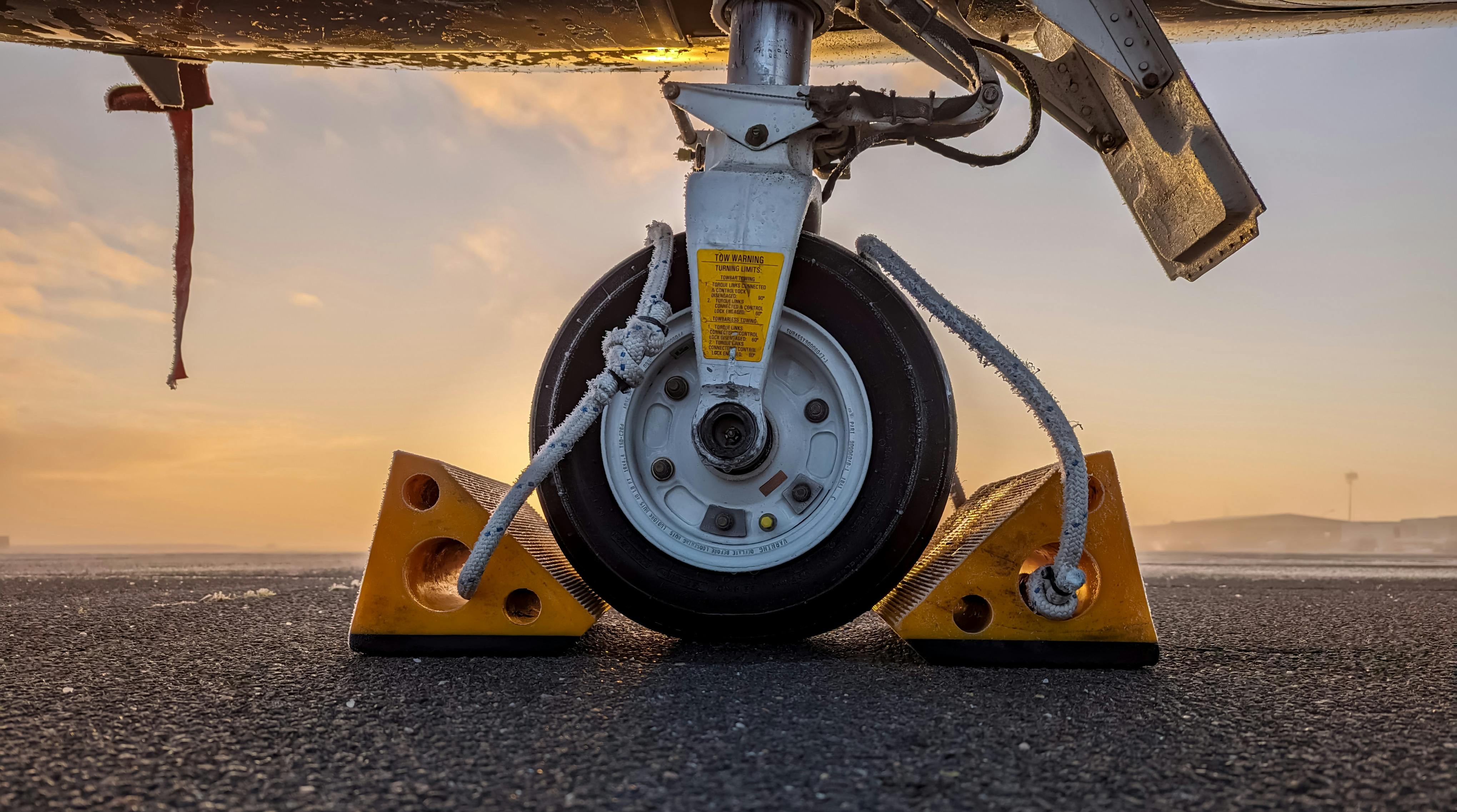 Aircraft Wheel on Asphalt · Free Stock Photo