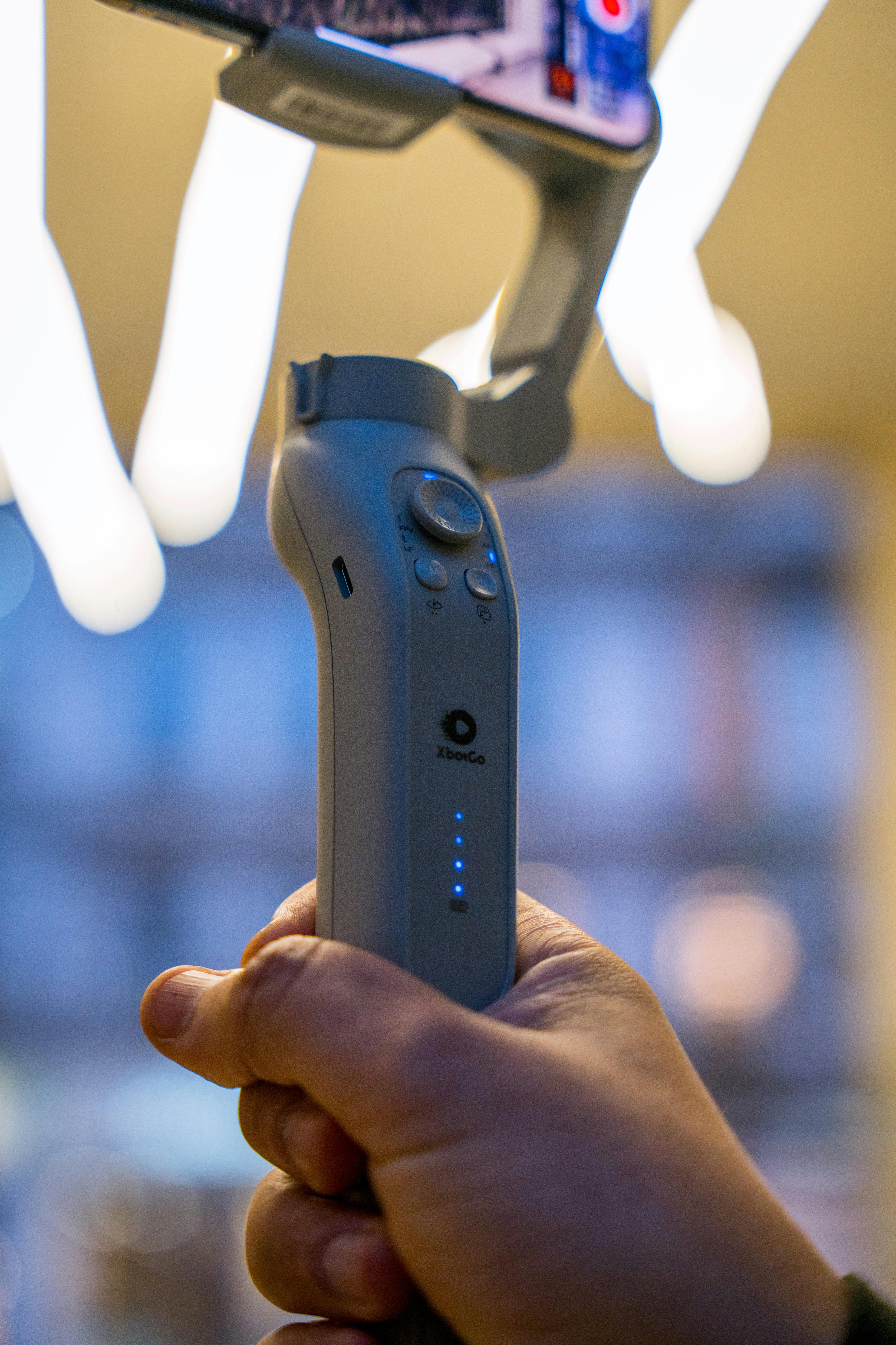 Hand Holding Gimbal · Free Stock Photo