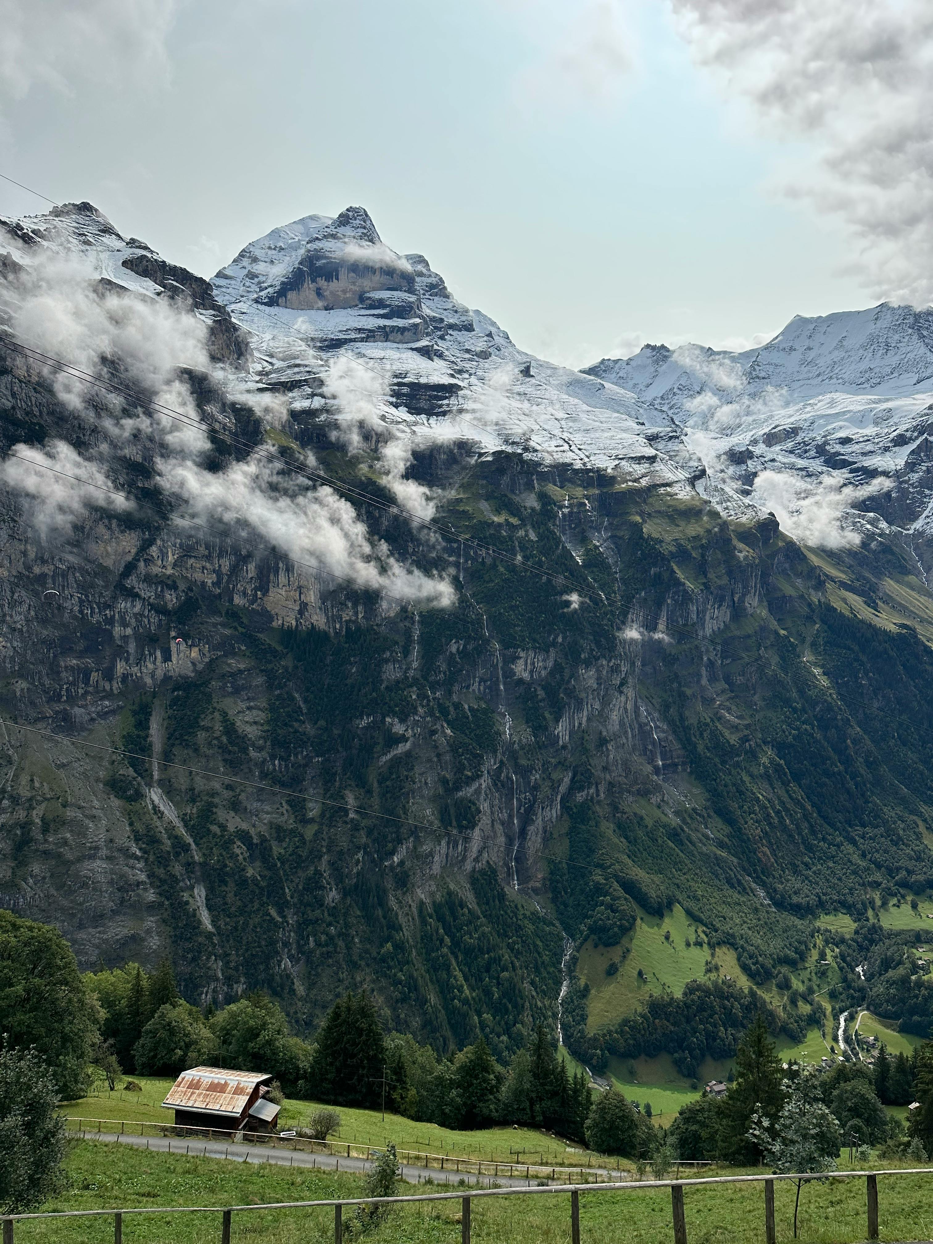 Building in Valley in Mountains Landscape · Free Stock Photo