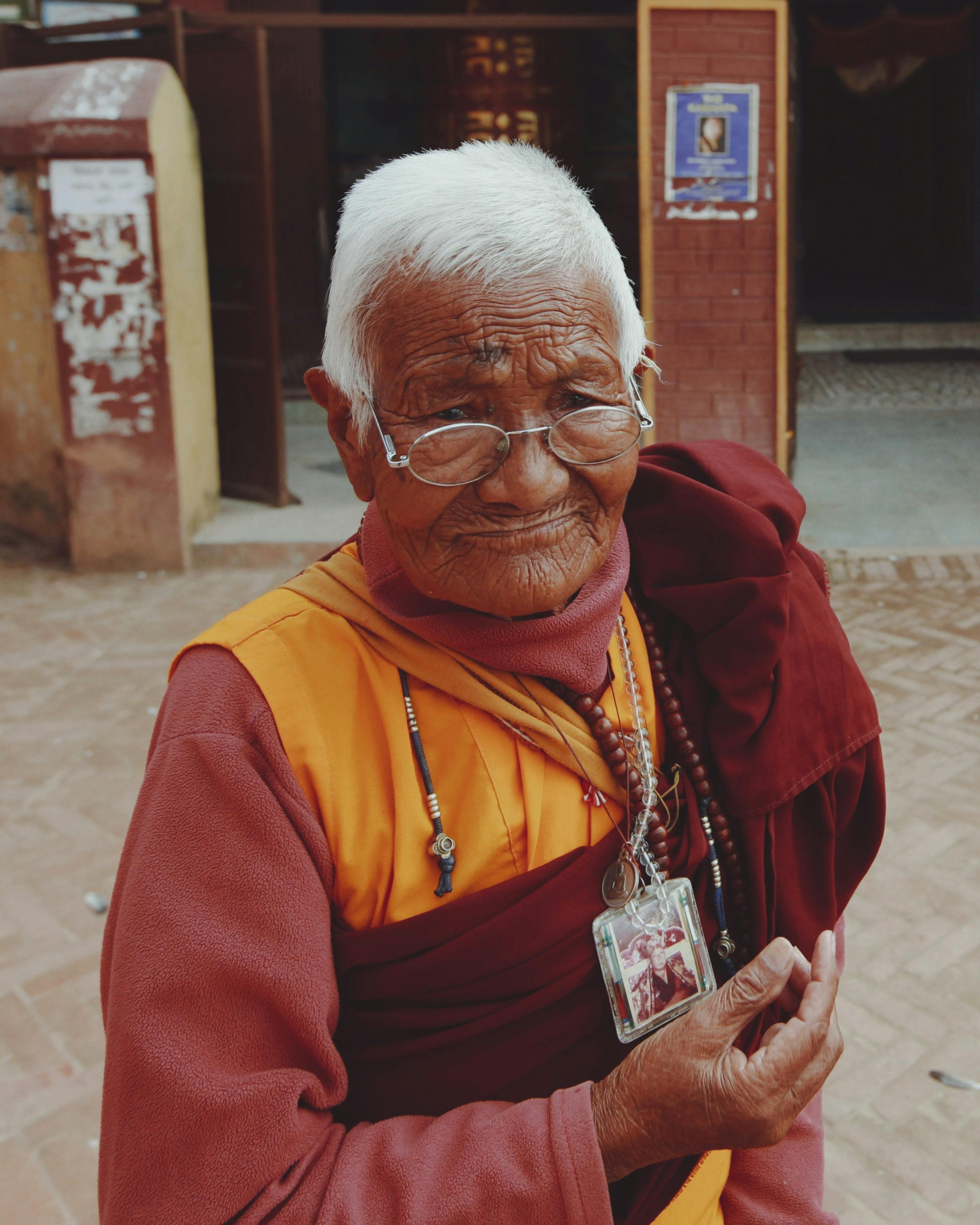 Portrait of Elderly Buddhist Monk · Free Stock Photo