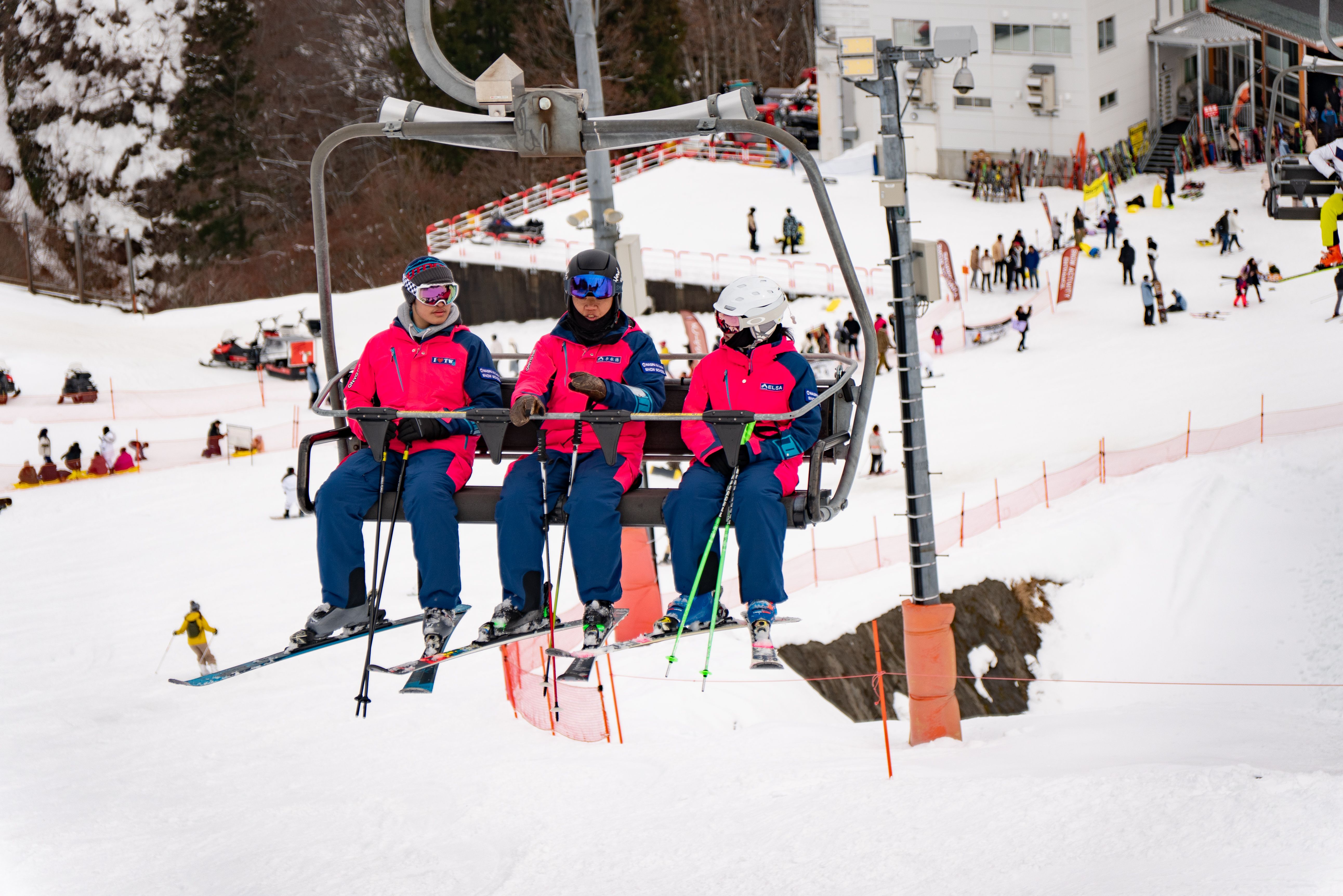 Skiers on Ski Lift · Free Stock Photo