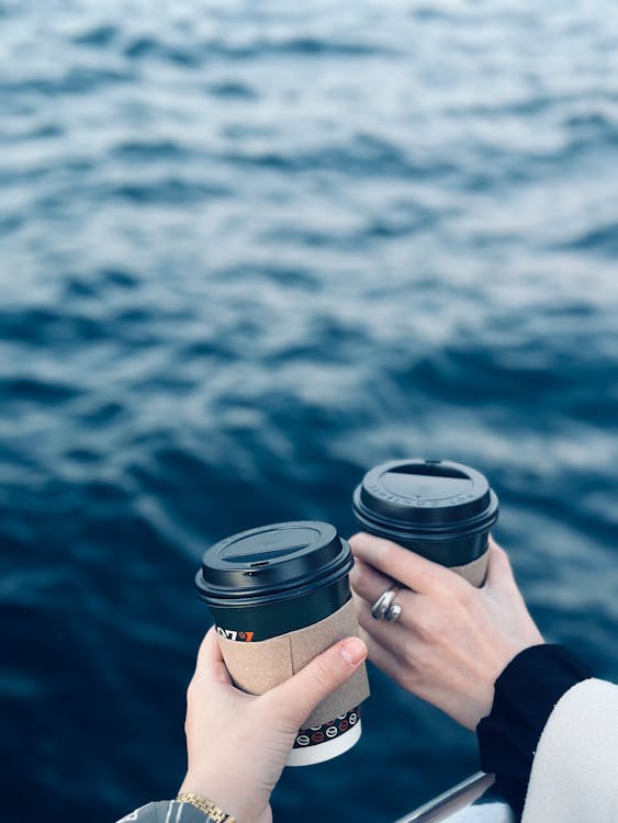 Two Hands Holding Coffee Cups · Free Stock Photo Two Hands Holding Coffee Cups · Free Stock Photo