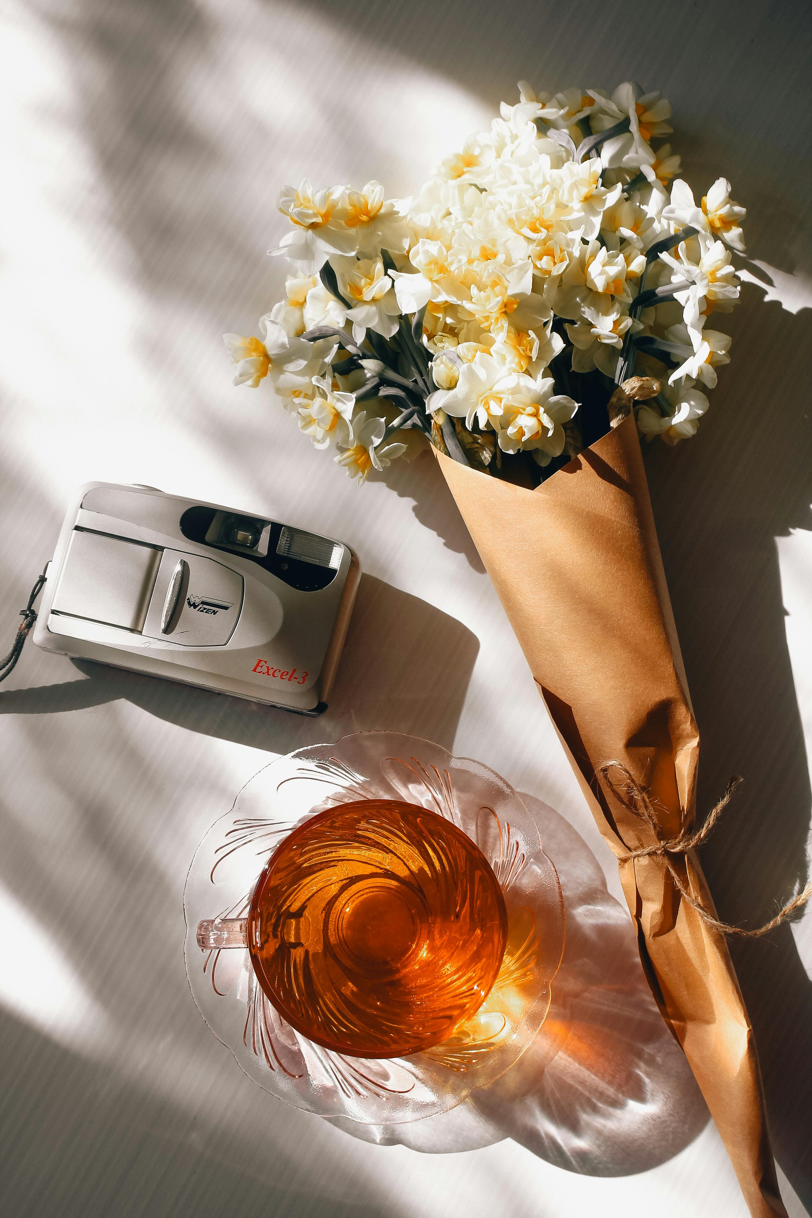 Tea, Camera and Flower Bouquet · Free Stock Photo