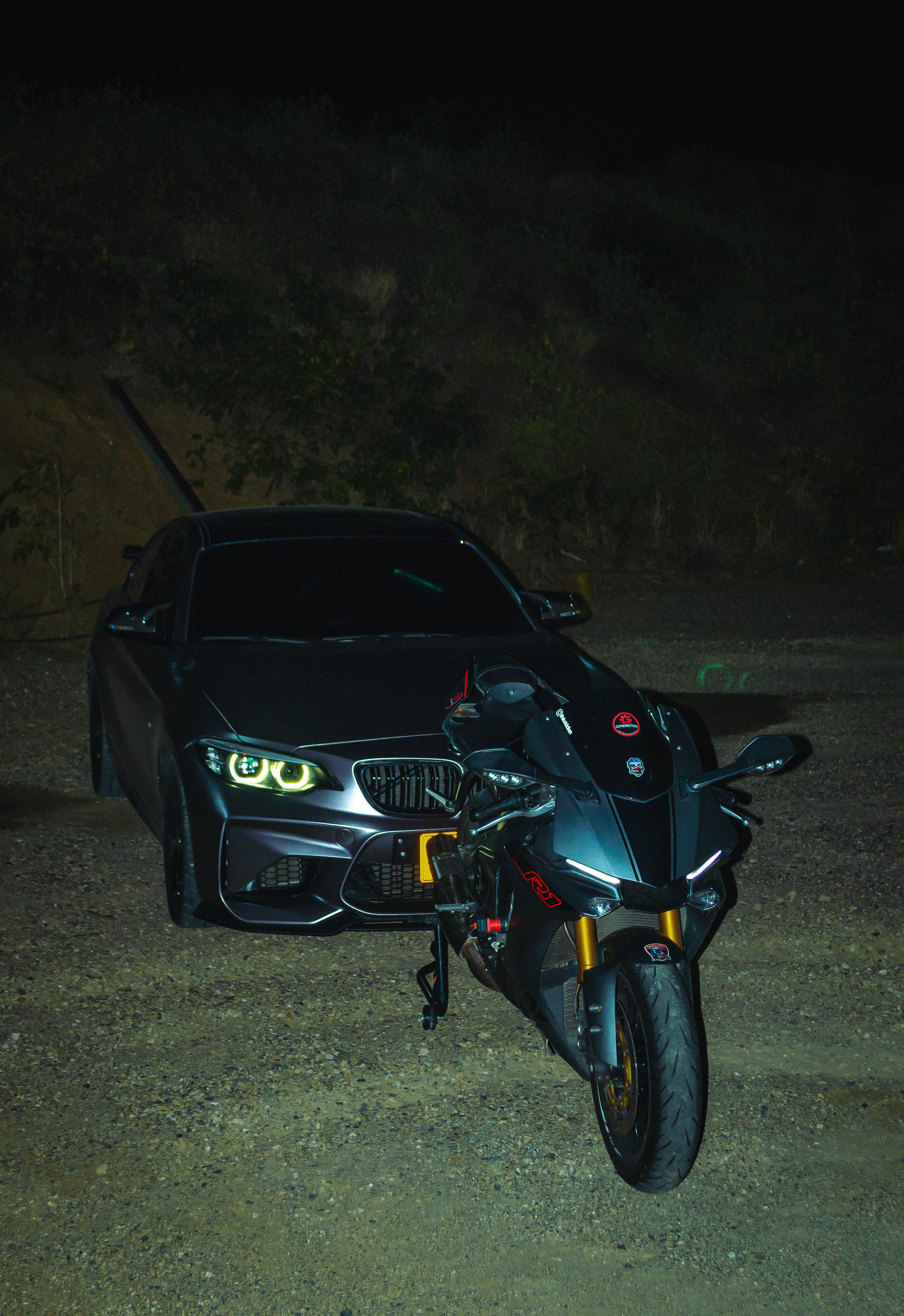 Sports BMW Car and Yamaha Motorbike at Night · Free Stock Photo