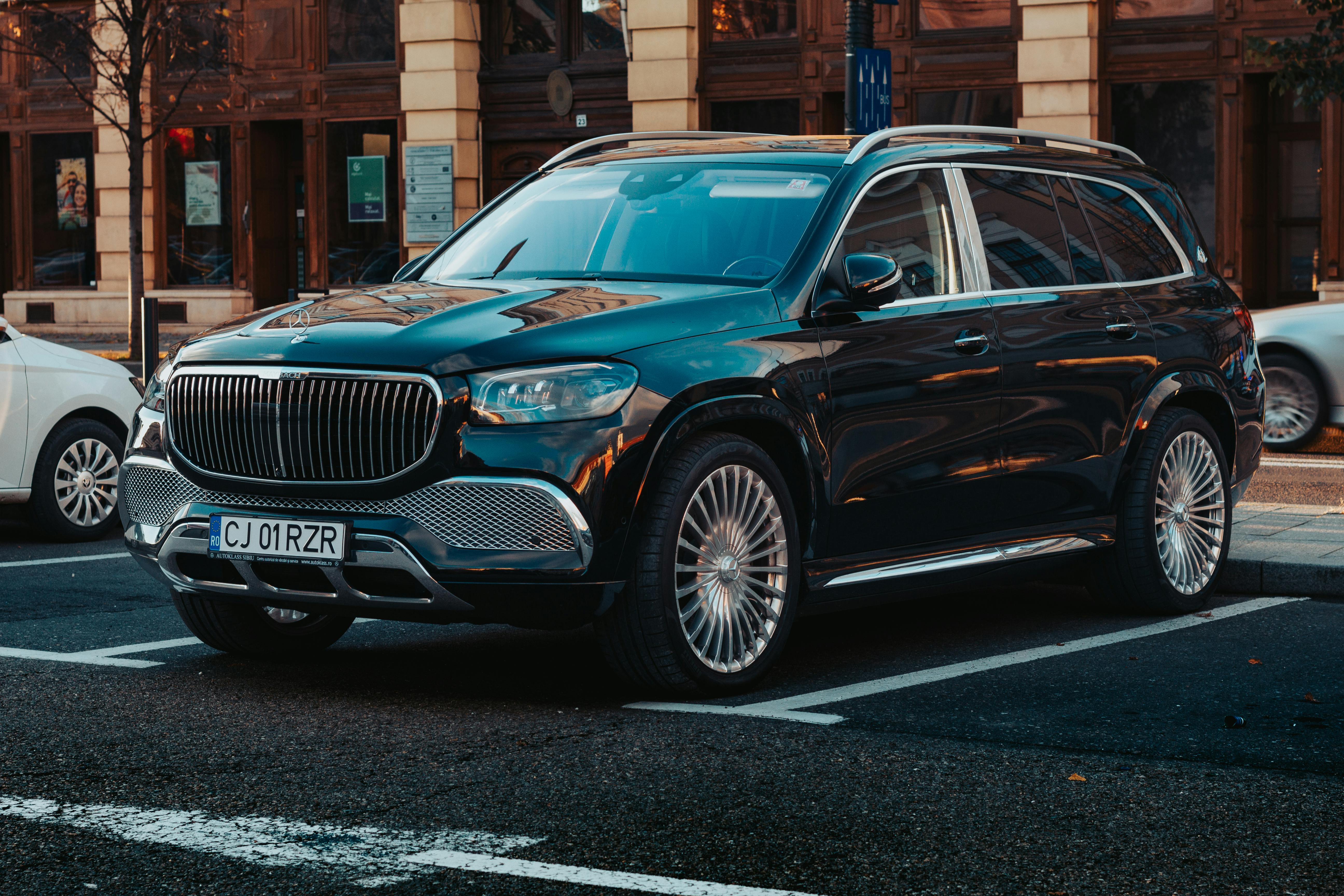 Black Clean Mercedes Car Standing in a Parking Lot · Free Stock Photo