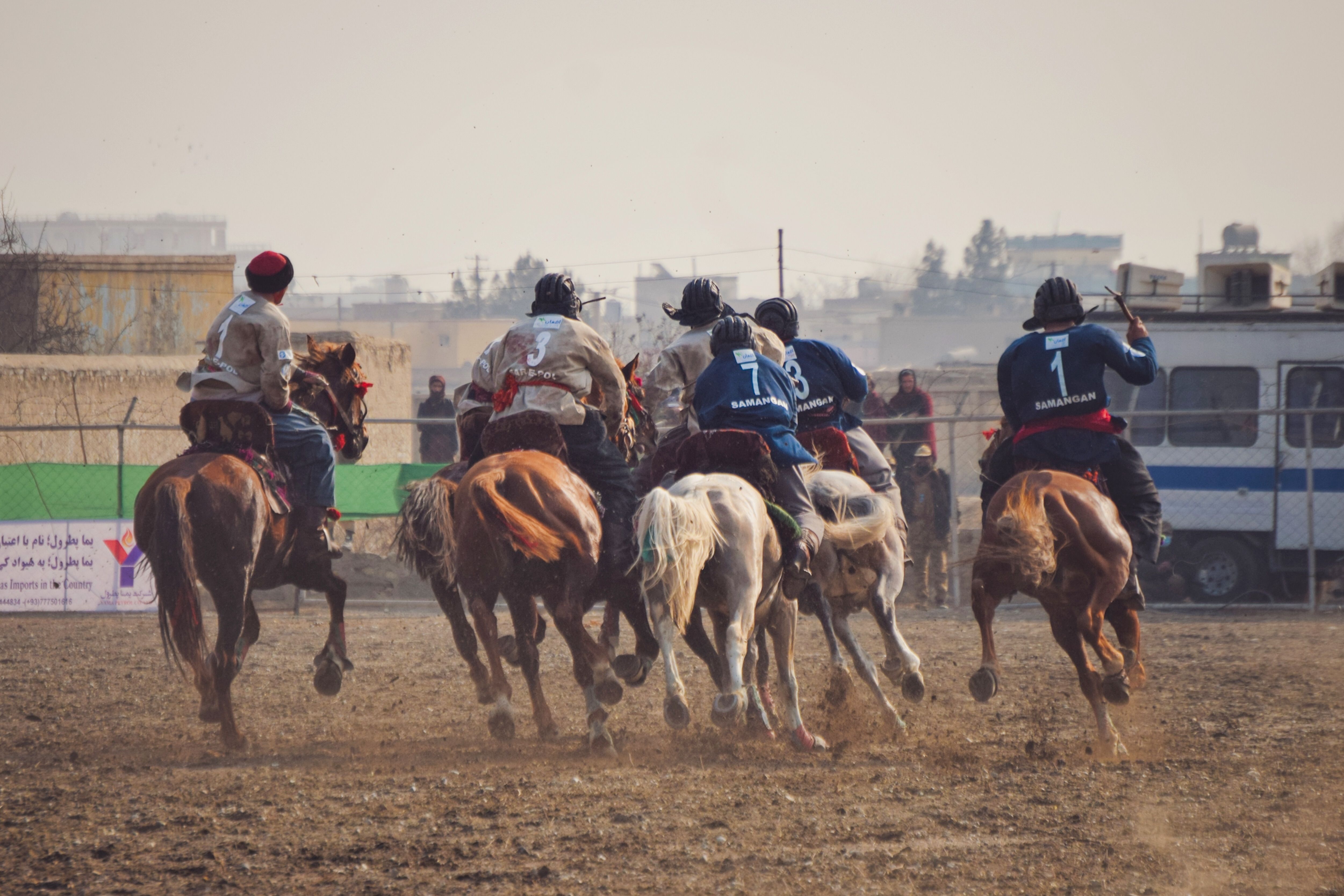 Back View of Men Playing Buzkashi · Free Stock Photo