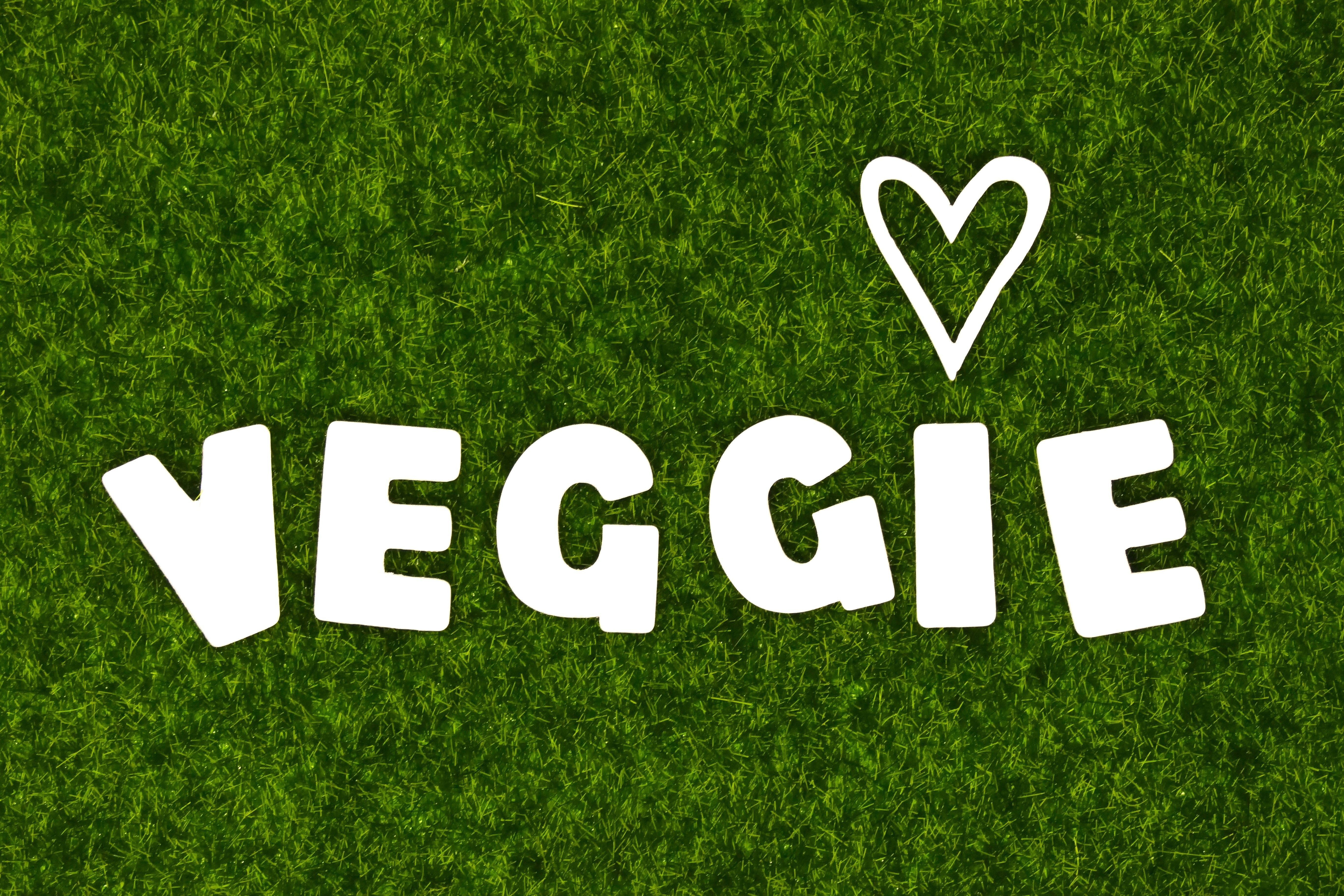 White Letters on the Grass Forming Veggie Word · Free Stock Photo