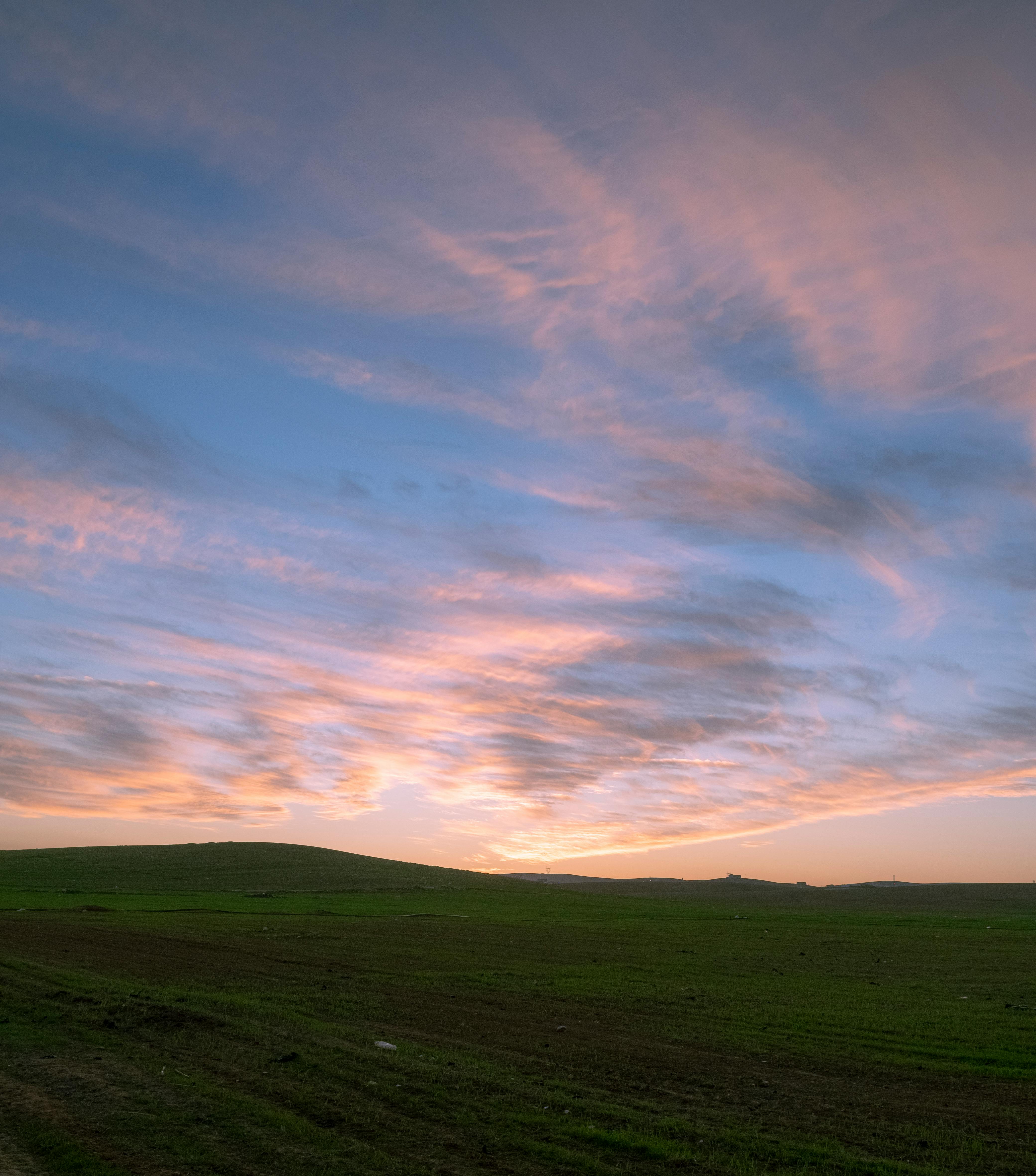 Dramatic Sky over Rural Fields at Dusk · Free Stock Photo