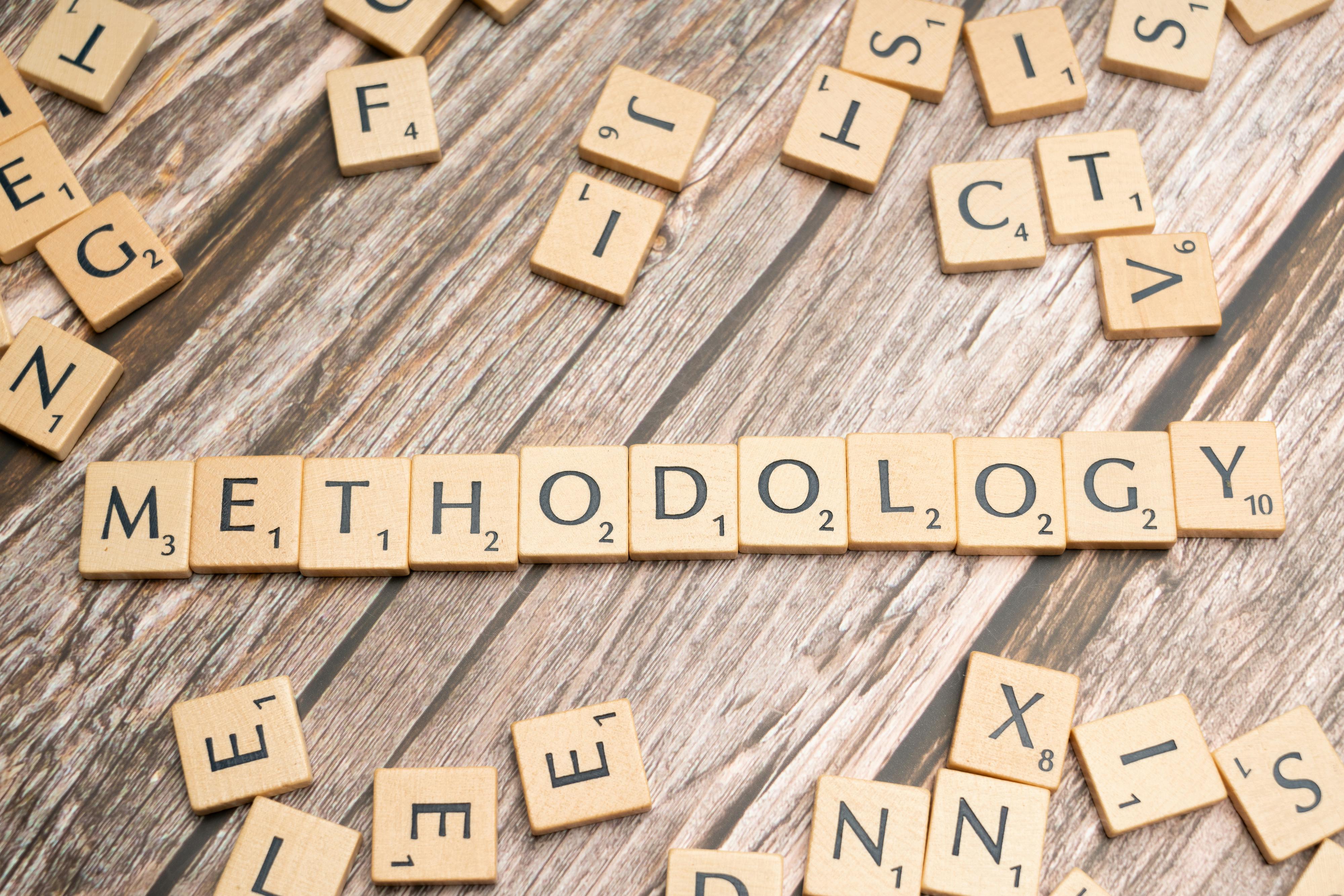 The word methodology spelled out with scrabble tiles · Free Stock Photo